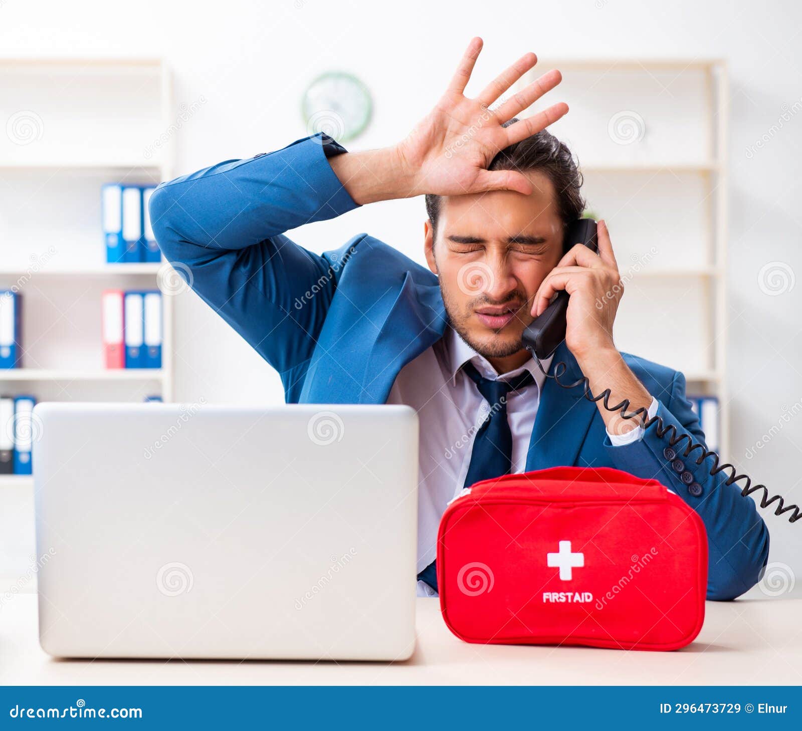 Young Male Employee in First Aid Concept Stock Image - Image of ...