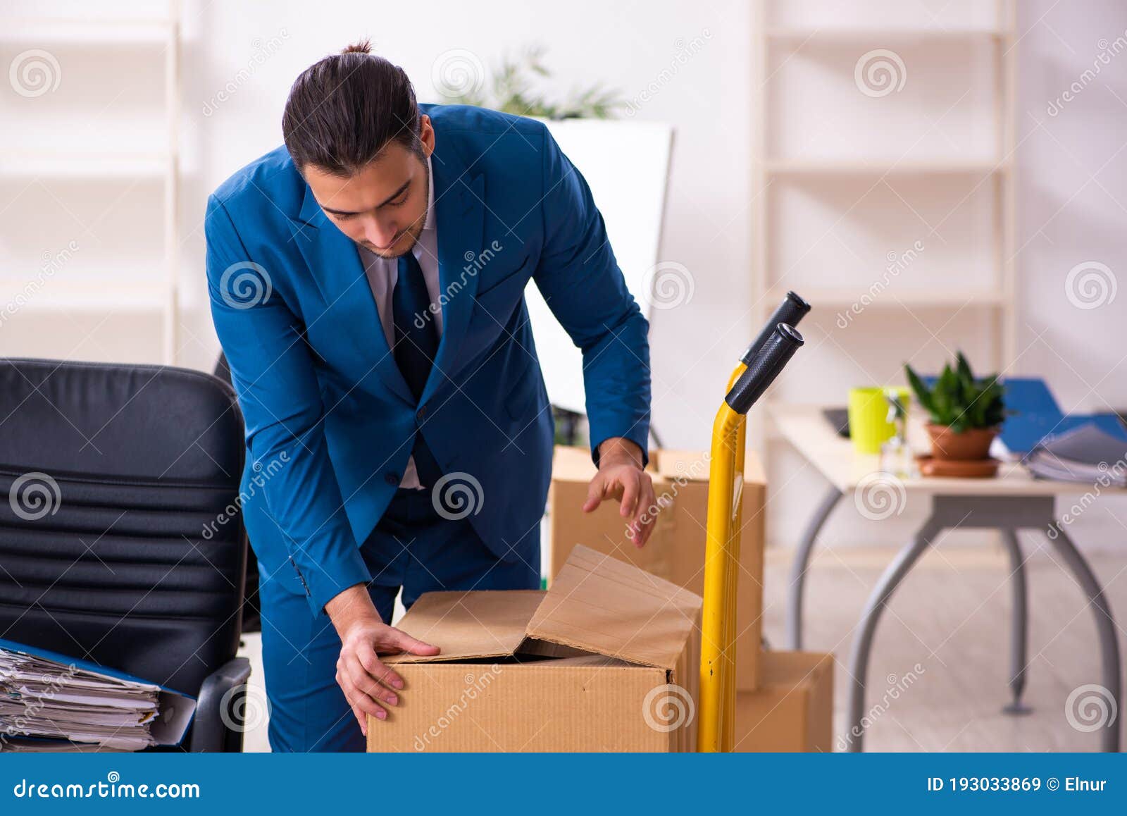 Young Male Employee in Moving Concept Stock Image - Image of ...