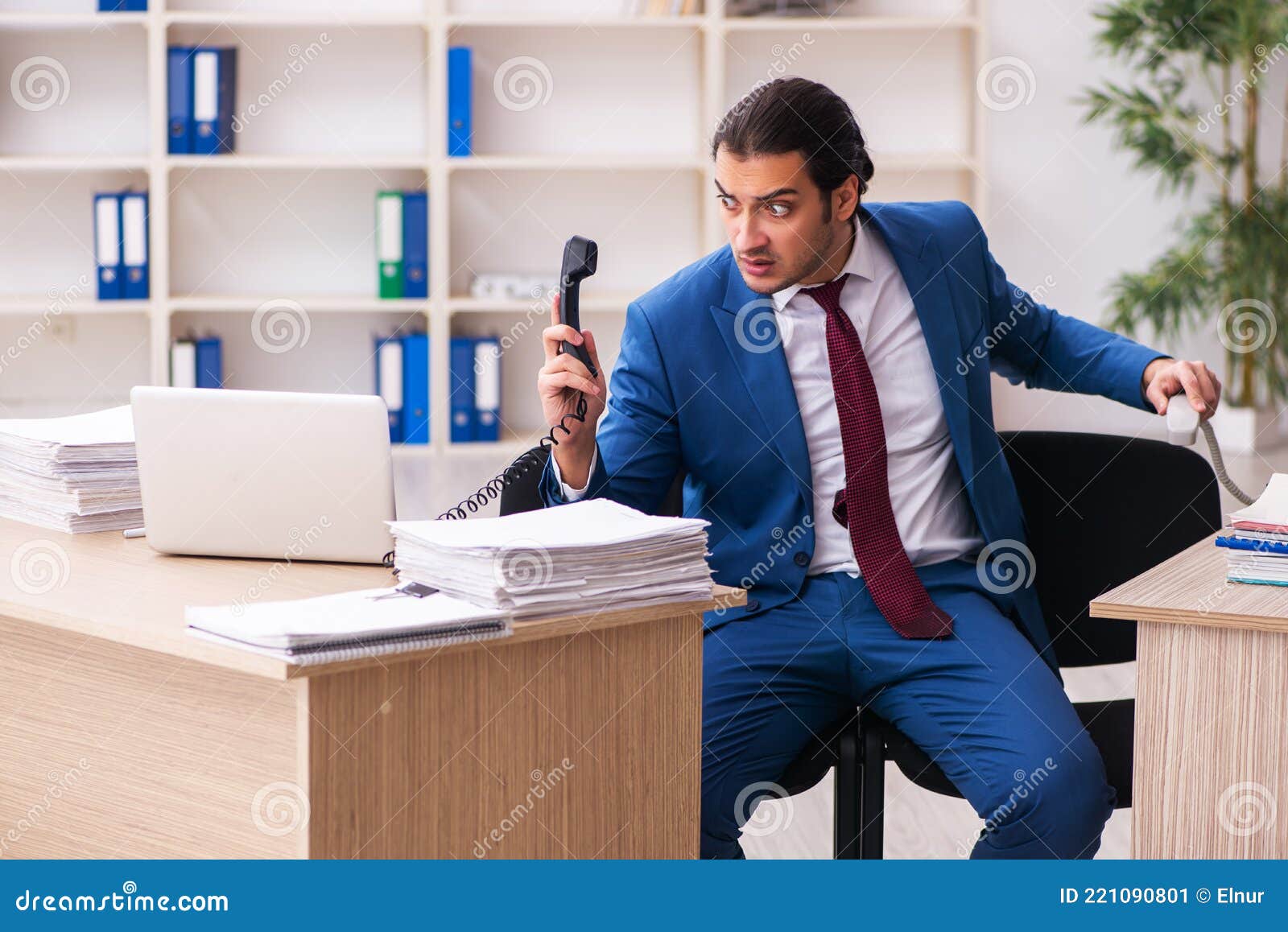 Young Male Employee in Multitasking Concept Stock Image - Image of ...