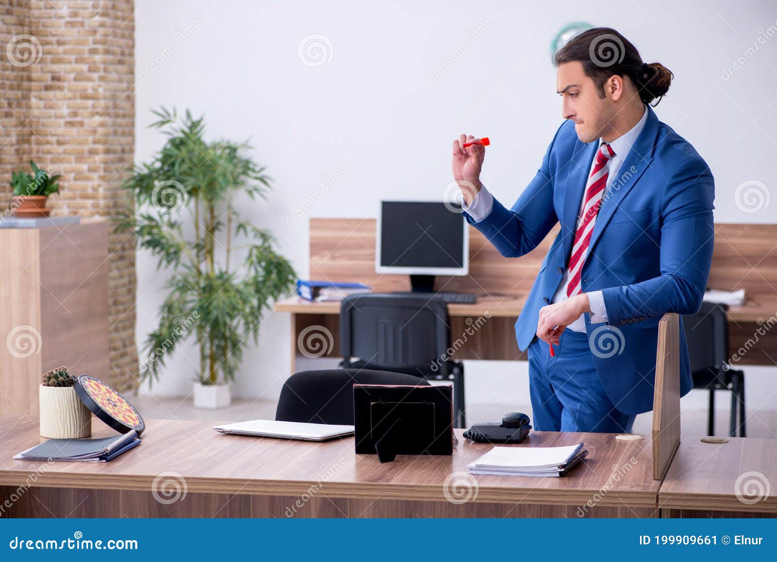 Young Male Employee Playing Darts in the Office Stock Image - Image of ...