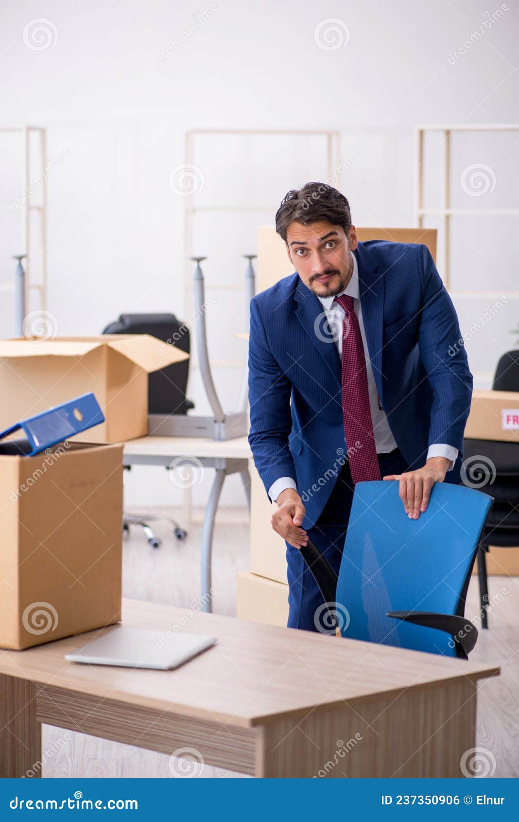 Young Male Employee in Relocation Concept Stock Photo - Image of ...