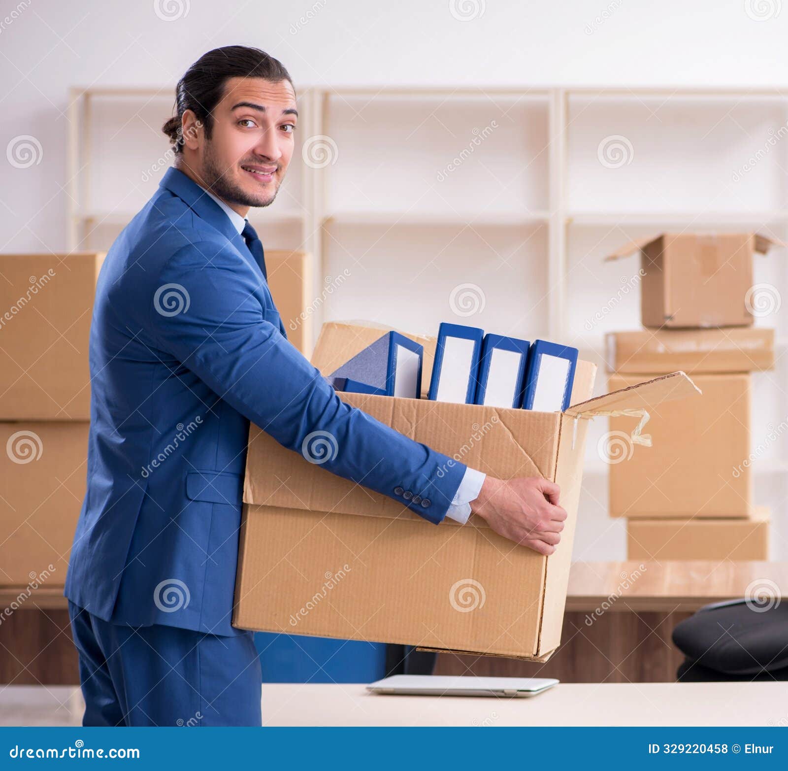 Young Male Employee in Relocation Concept Stock Photo - Image of ...