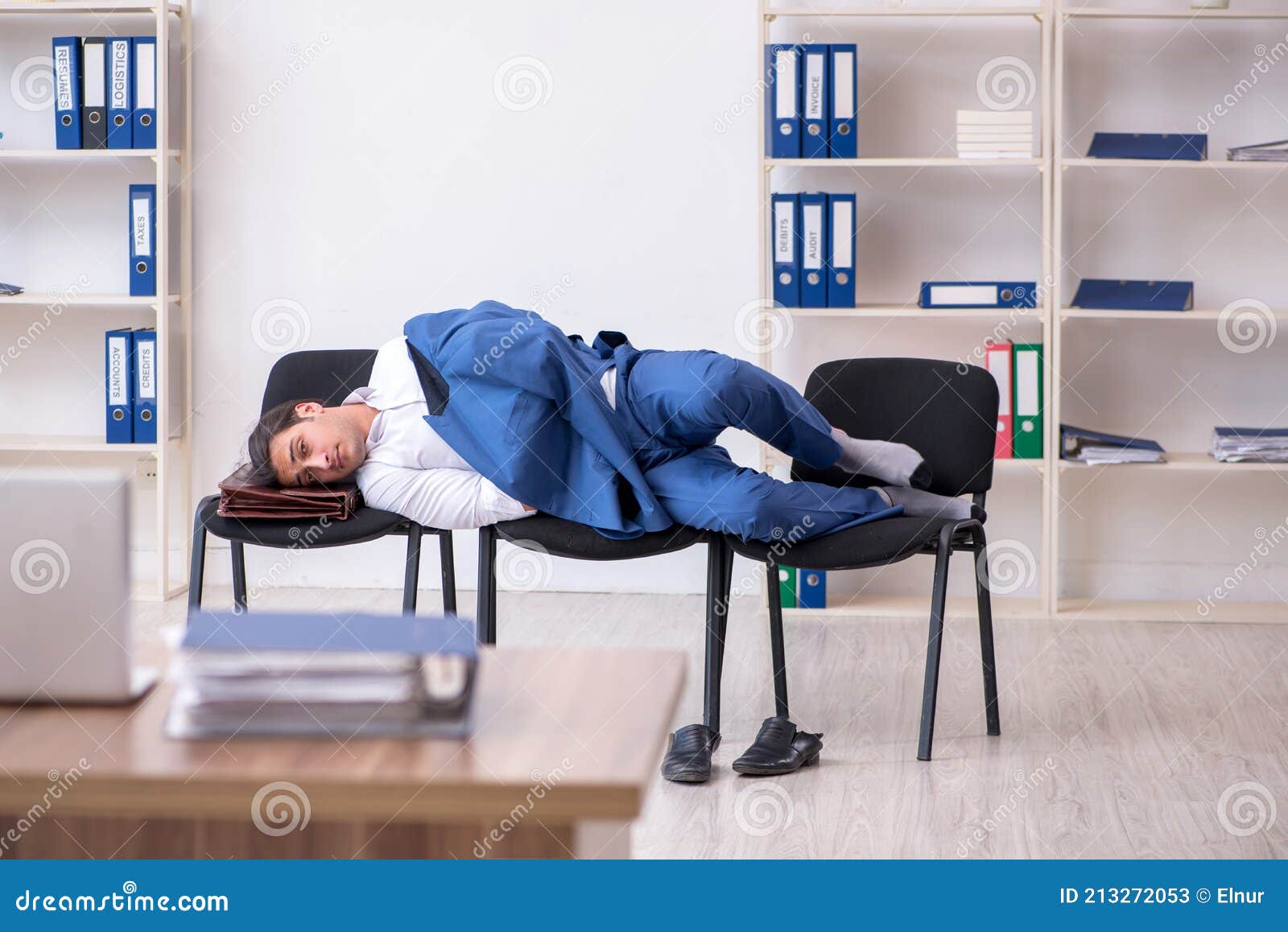 Young Male Employee Sleeping in the Office on Chairs Stock Image ...