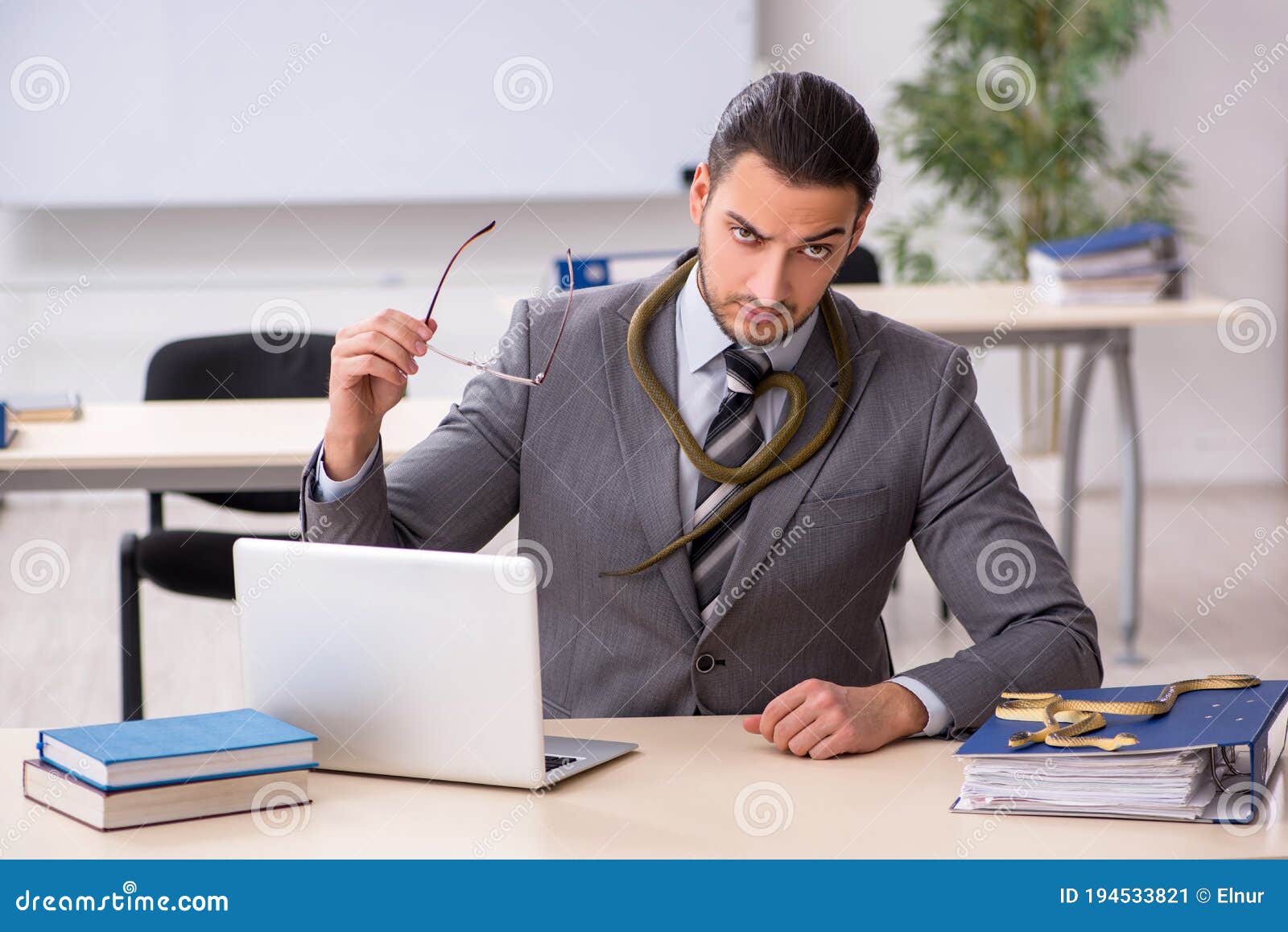 Young Male Employee with Snake in the Office Stock Image - Image of ...