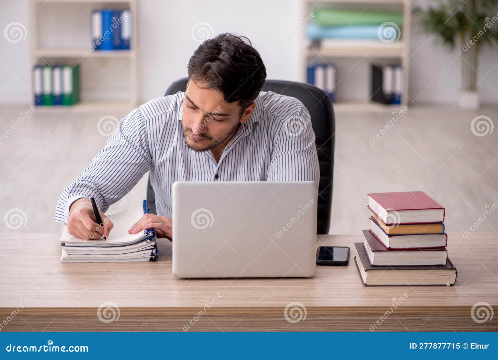 Young Male Employee Student Working in the Office Stock Image - Image ...