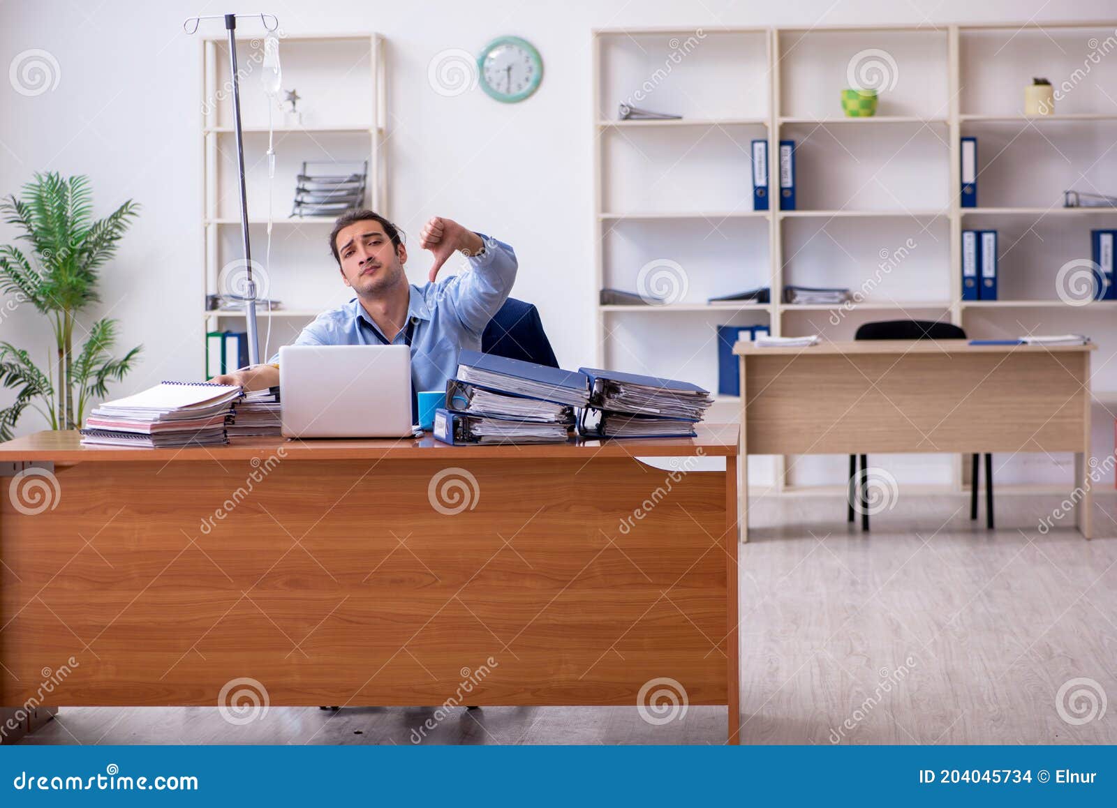 Young Male Employee Suffering at Workplace Stock Photo - Image of ...