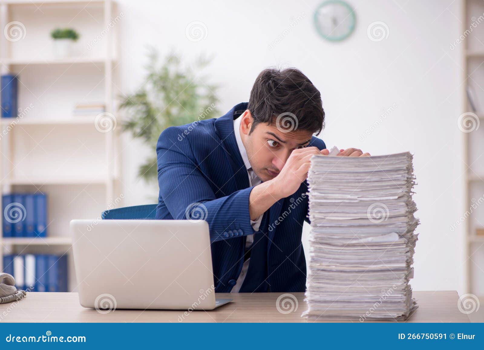 Young Male Employee and Too Much Work in the Office Stock Image - Image ...