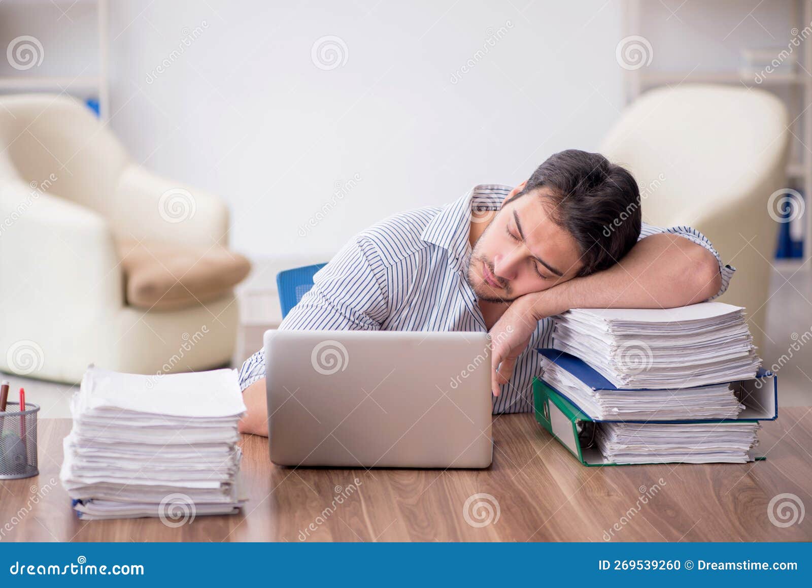 Young Male Employee and Too Much Work in the Office Stock Photo - Image ...