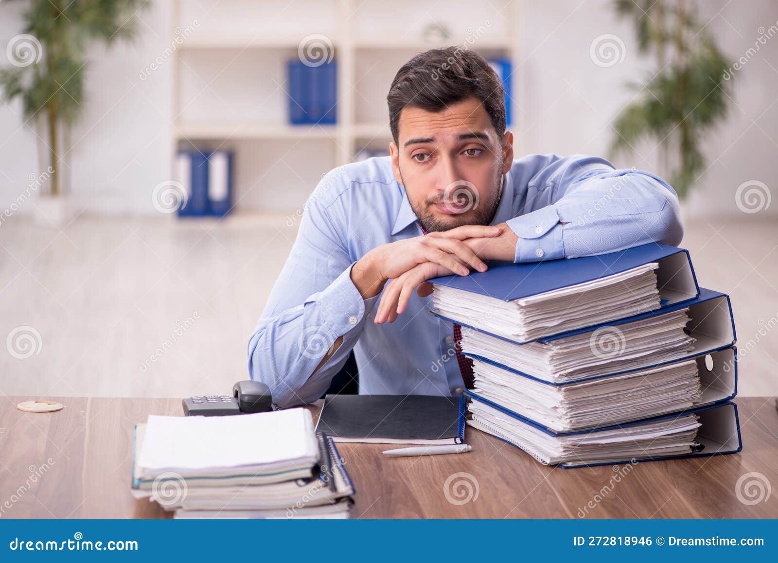 Young Male Employee and Too Much Work in the Office Stock Photo - Image ...