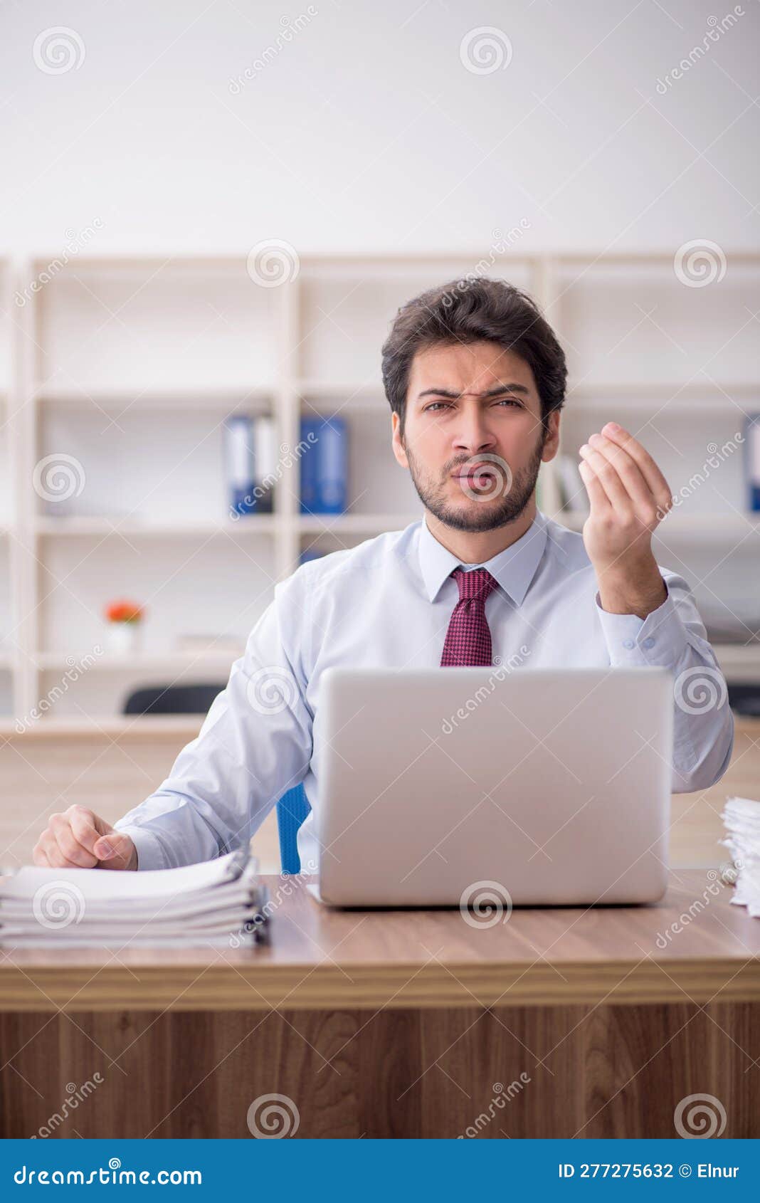 Young Male Employee and Too Much Work in the Office Stock Photo - Image ...
