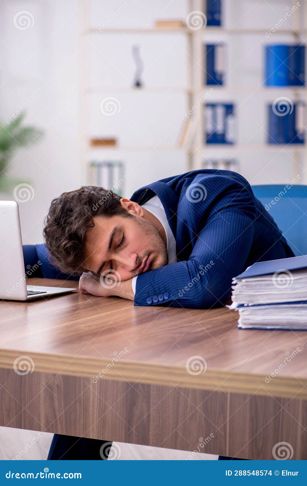 Young Male Employee and Too Much Work in the Office Stock Photo - Image ...