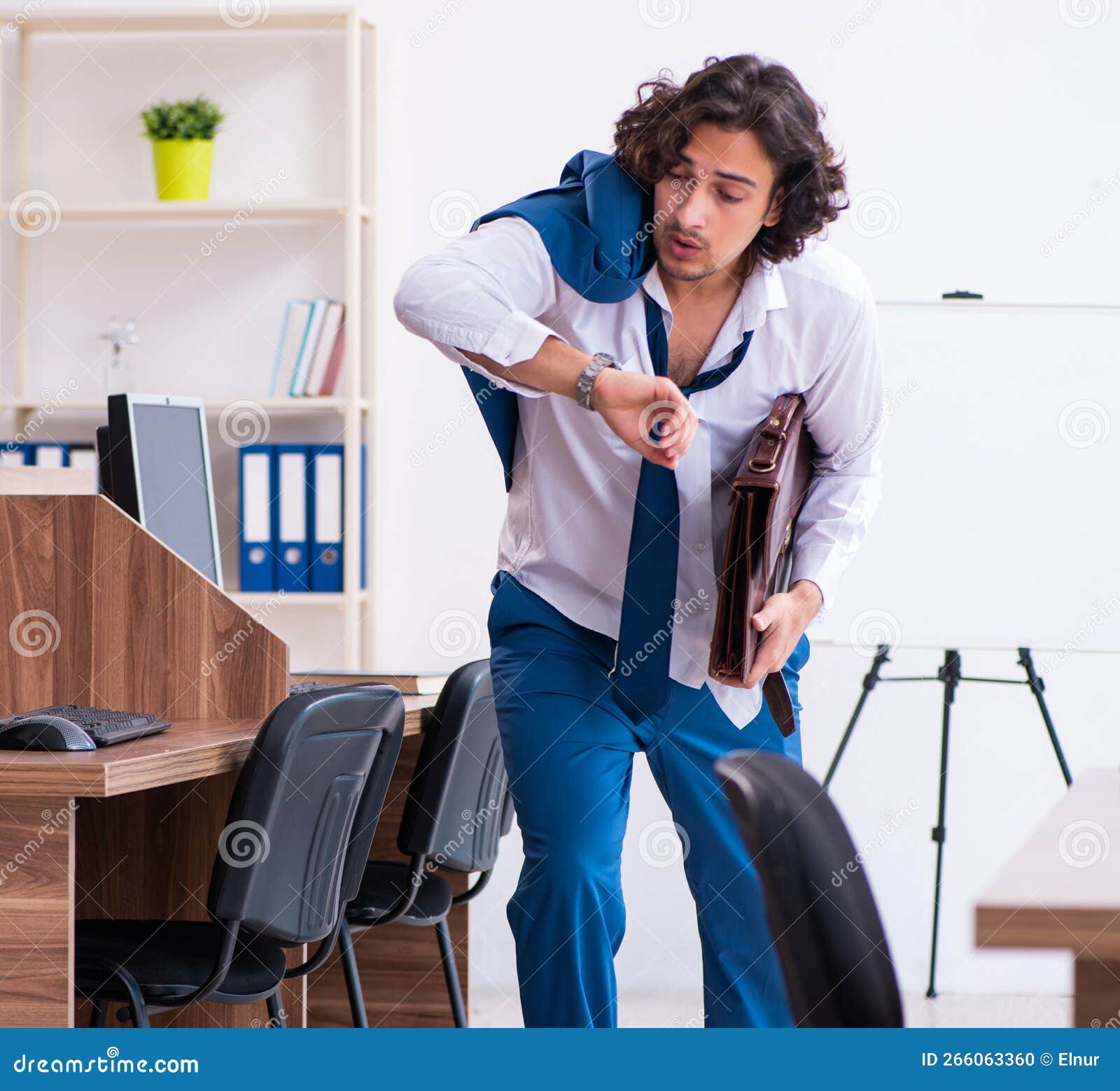 Young Male Employee Unhappy with Excessive Work Stock Photo - Image of ...