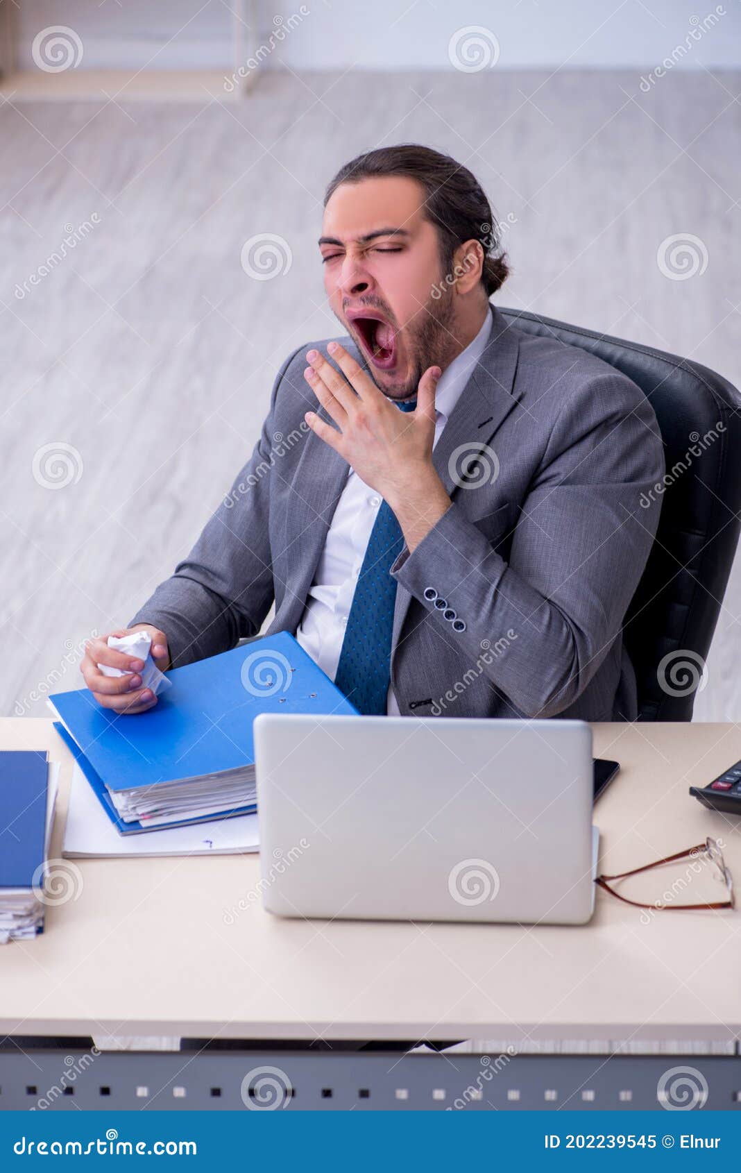 Young Male Employee Unhappy with Excessive Work in the Office Stock ...