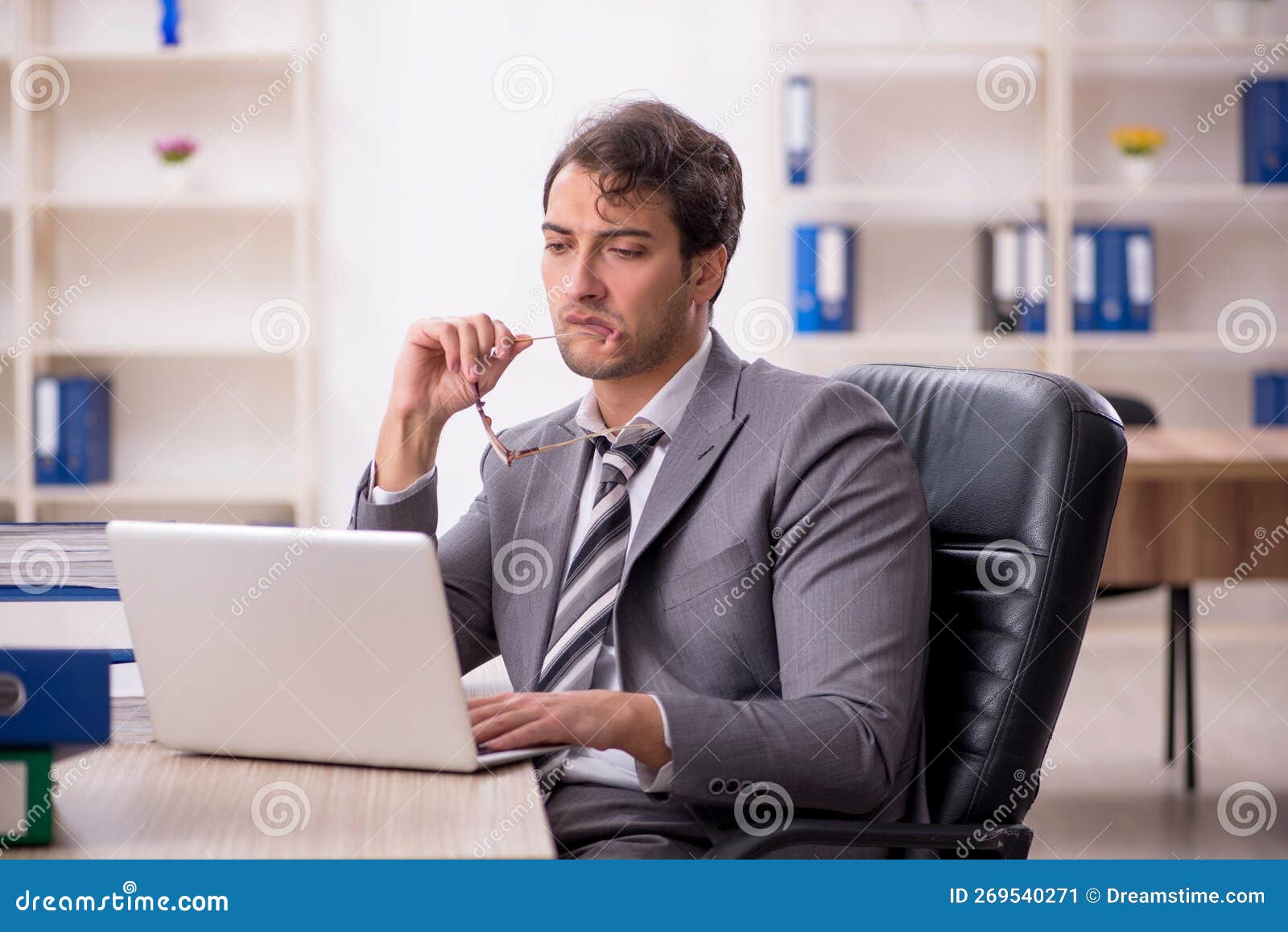 Young Male Employee Unhappy with Excessive Work in the Office Stock ...