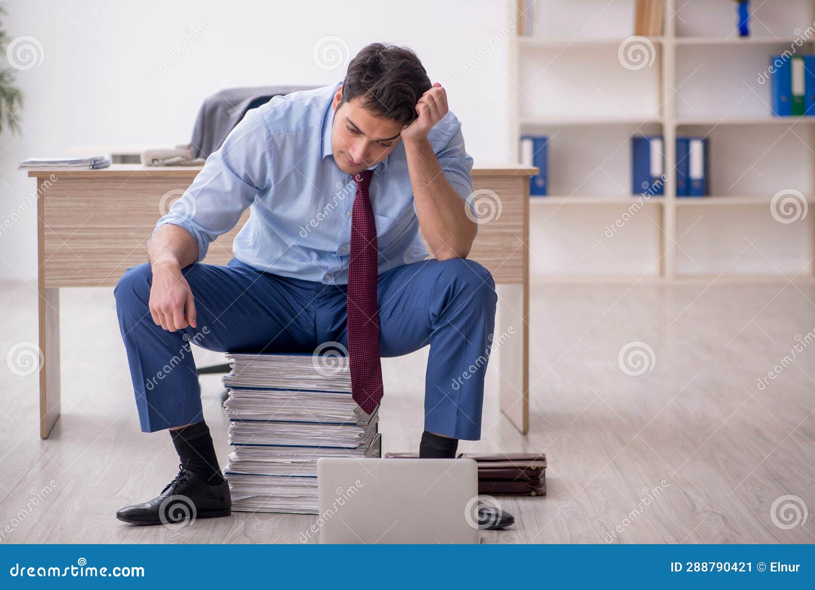 Young Male Employee Unhappy with Excessive Work in the Office Stock ...