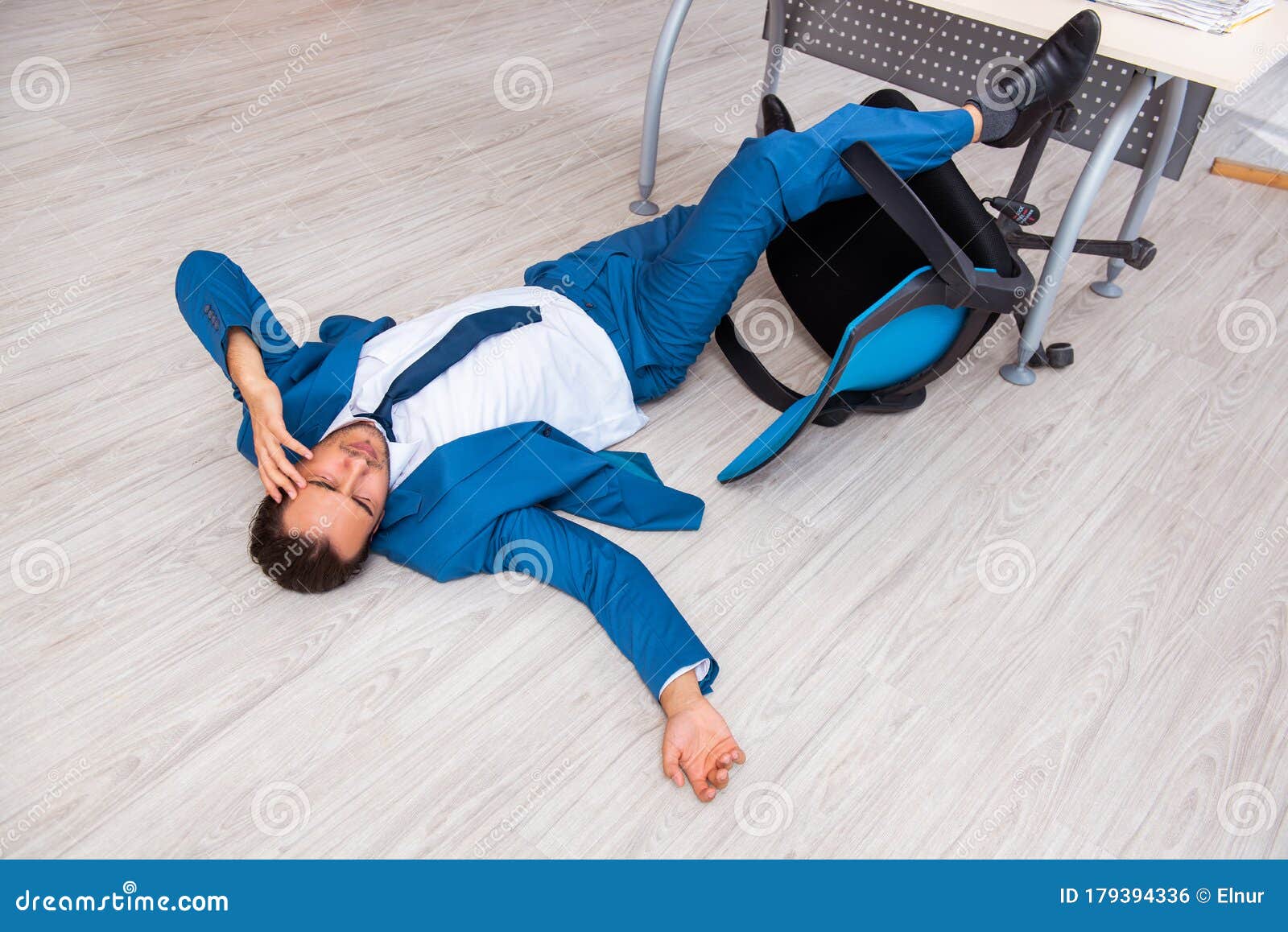 Young Male Employee in Work Accident Concept Stock Photo - Image of ...