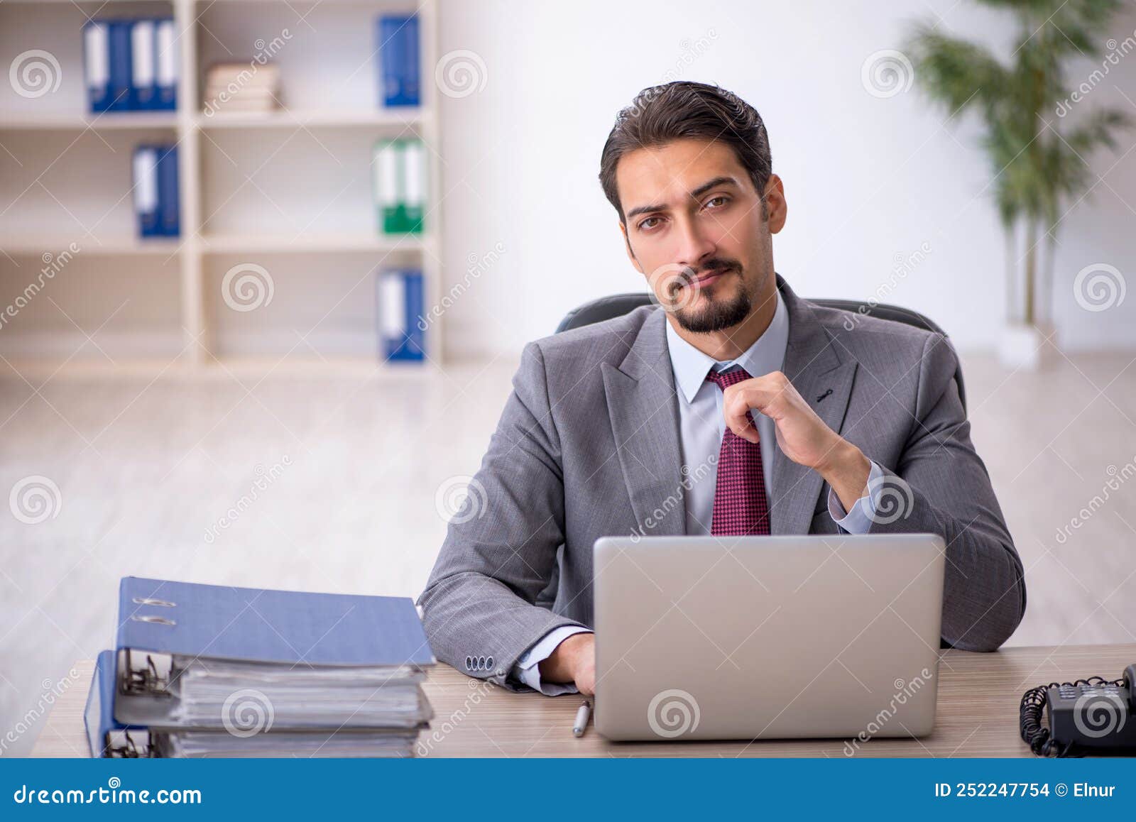 Young Male Employee Working in the Office Stock Photo - Image of desk ...