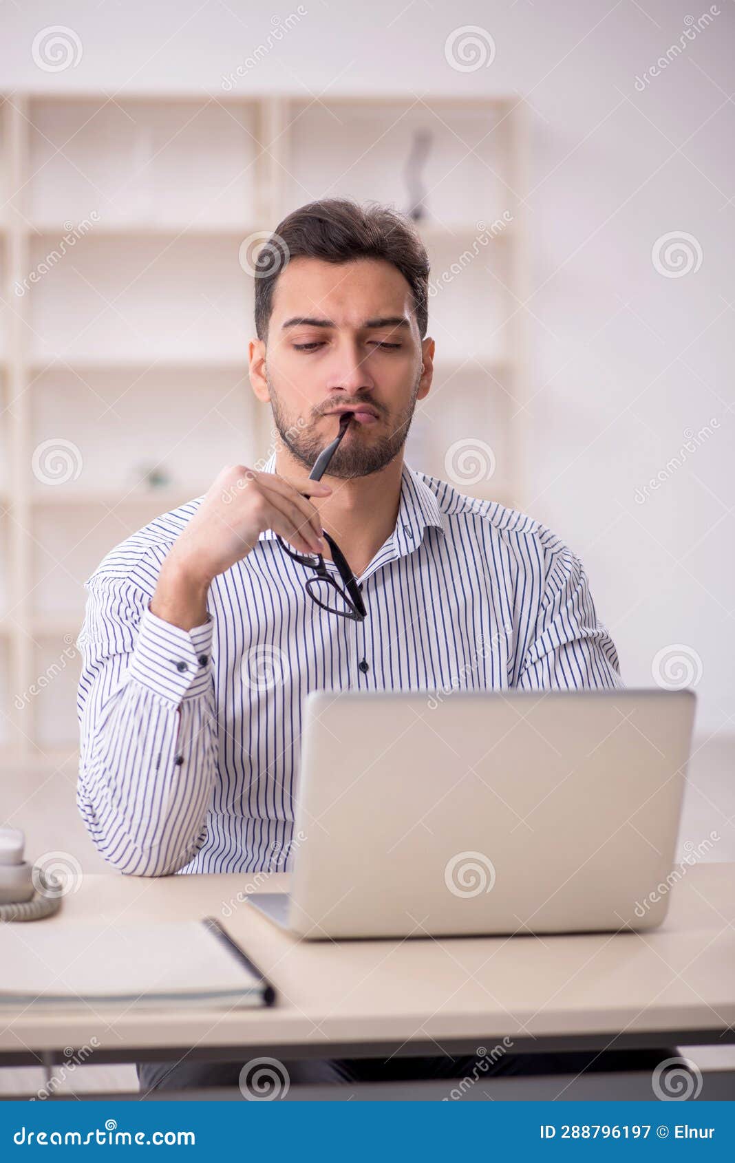 Young Male Employee Working in the Office Stock Image - Image of ...