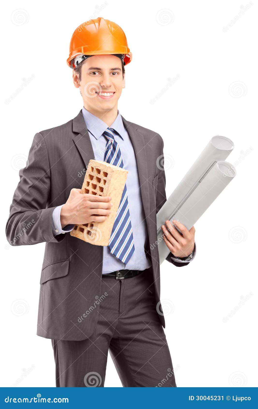 Young Male Engineer Holding a Brick and a Blueprint Stock Image - Image ...