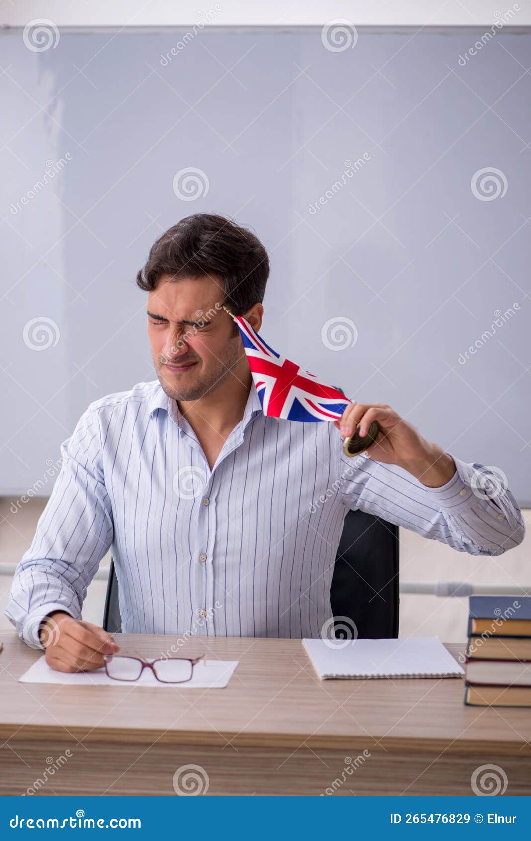 Young Male English Language Teacher in the Classroom Stock Image ...