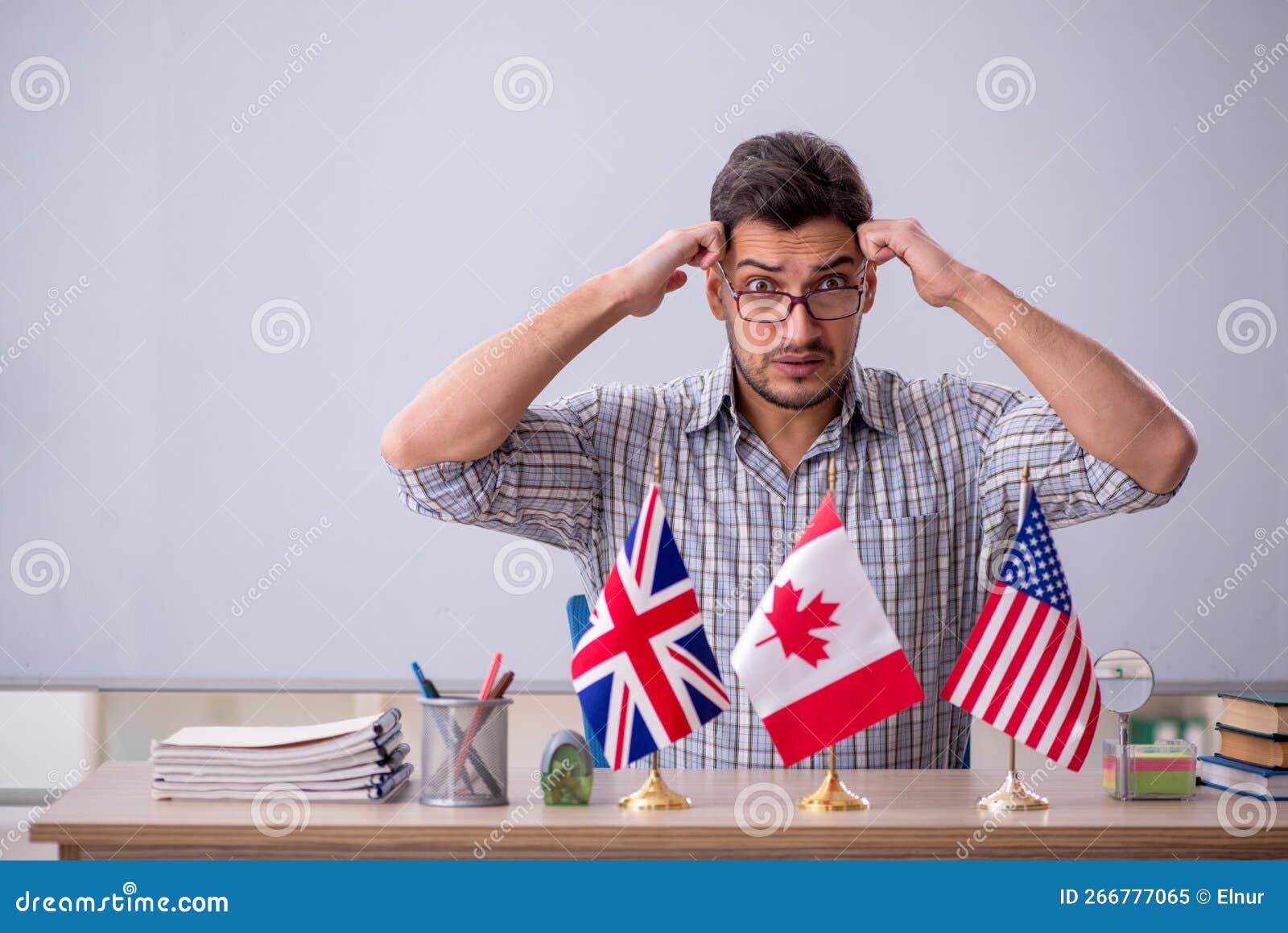 Young Male English Language Teacher in the Classroom Stock Image ...