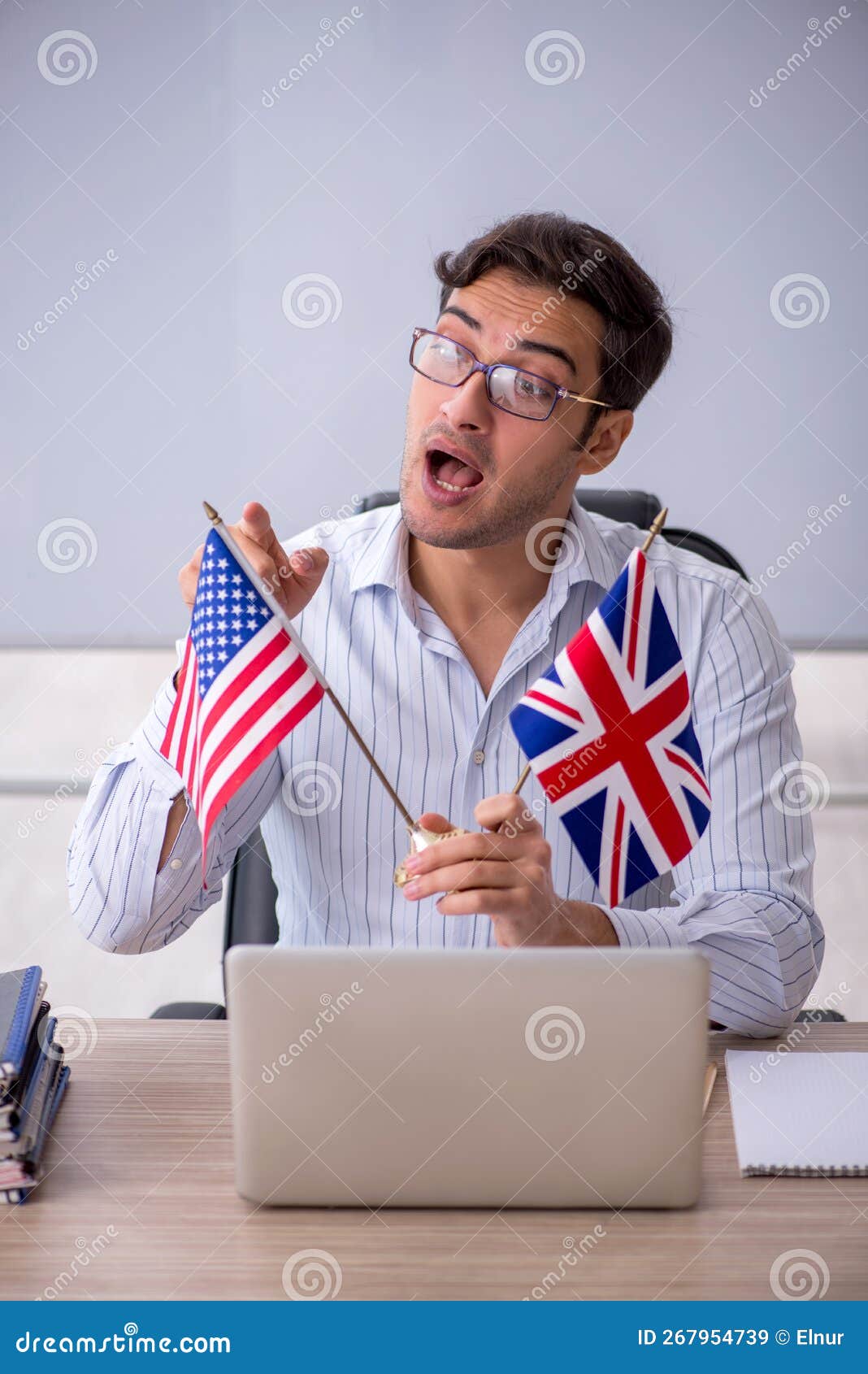 Young Male English Language Teacher in the Classroom Stock Image ...