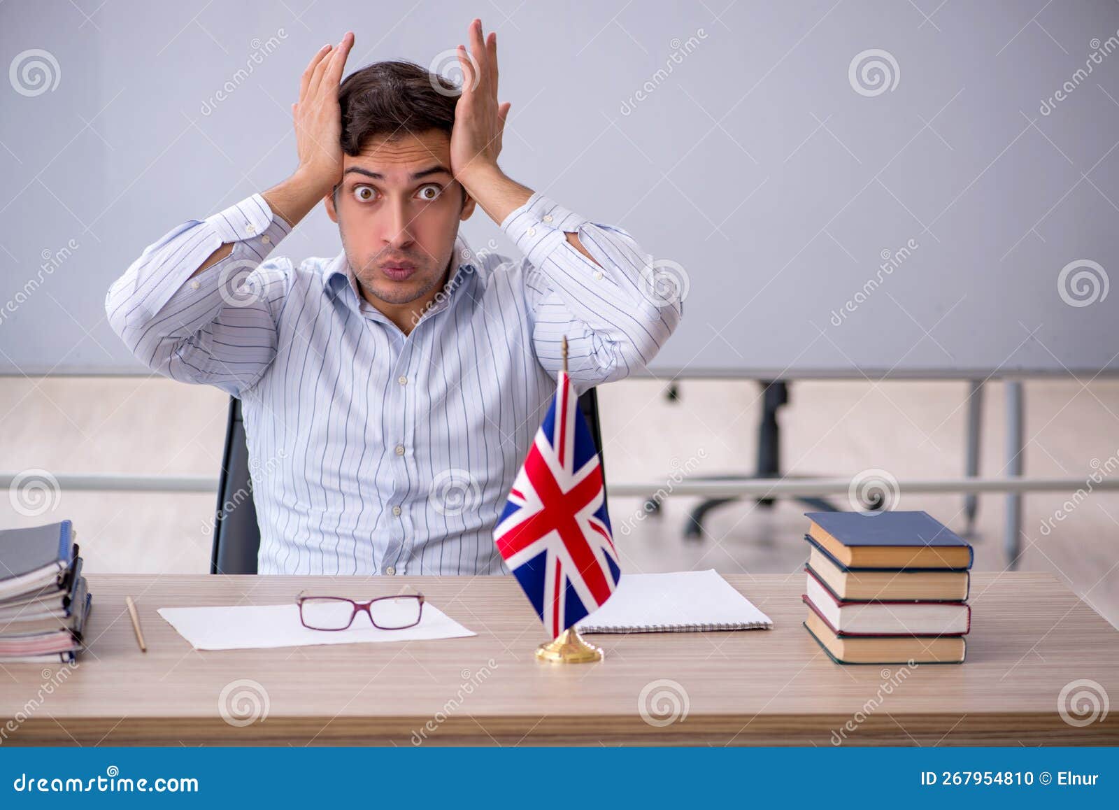 Young Male English Language Teacher in the Classroom Stock Photo ...