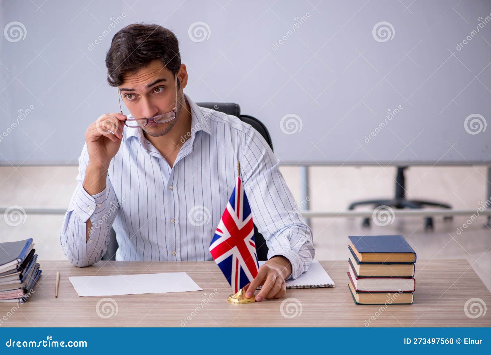 Young Male English Language Teacher in the Classroom Stock Photo ...