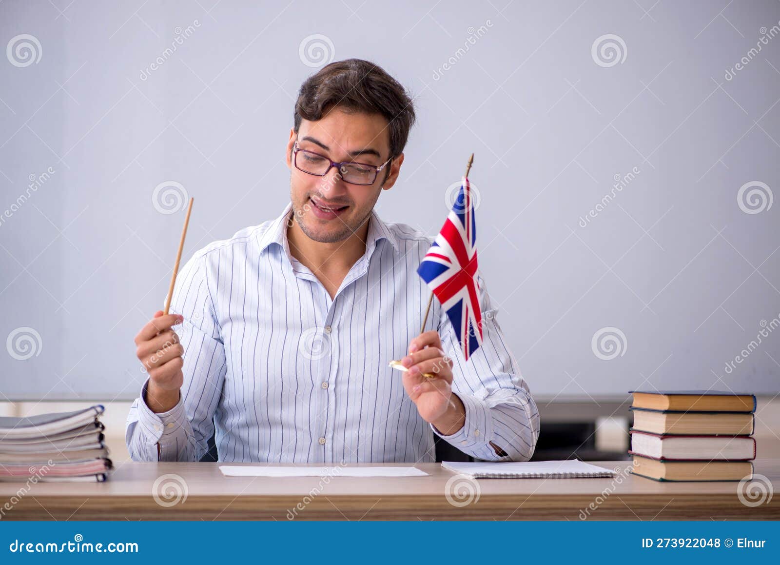 Young Male English Language Teacher in the Classroom Stock Photo ...