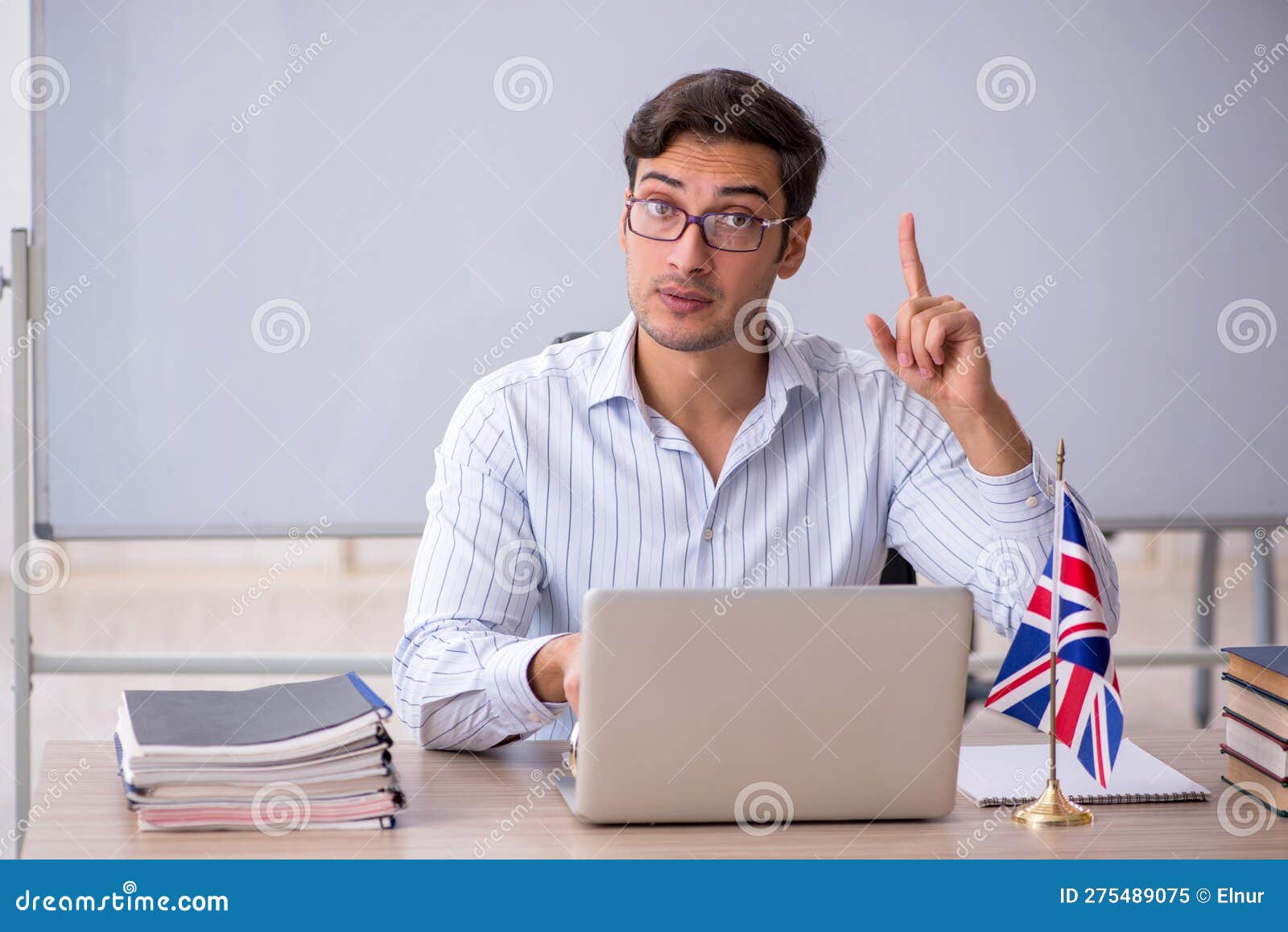 Young Male English Language Teacher in the Classroom Stock Image ...