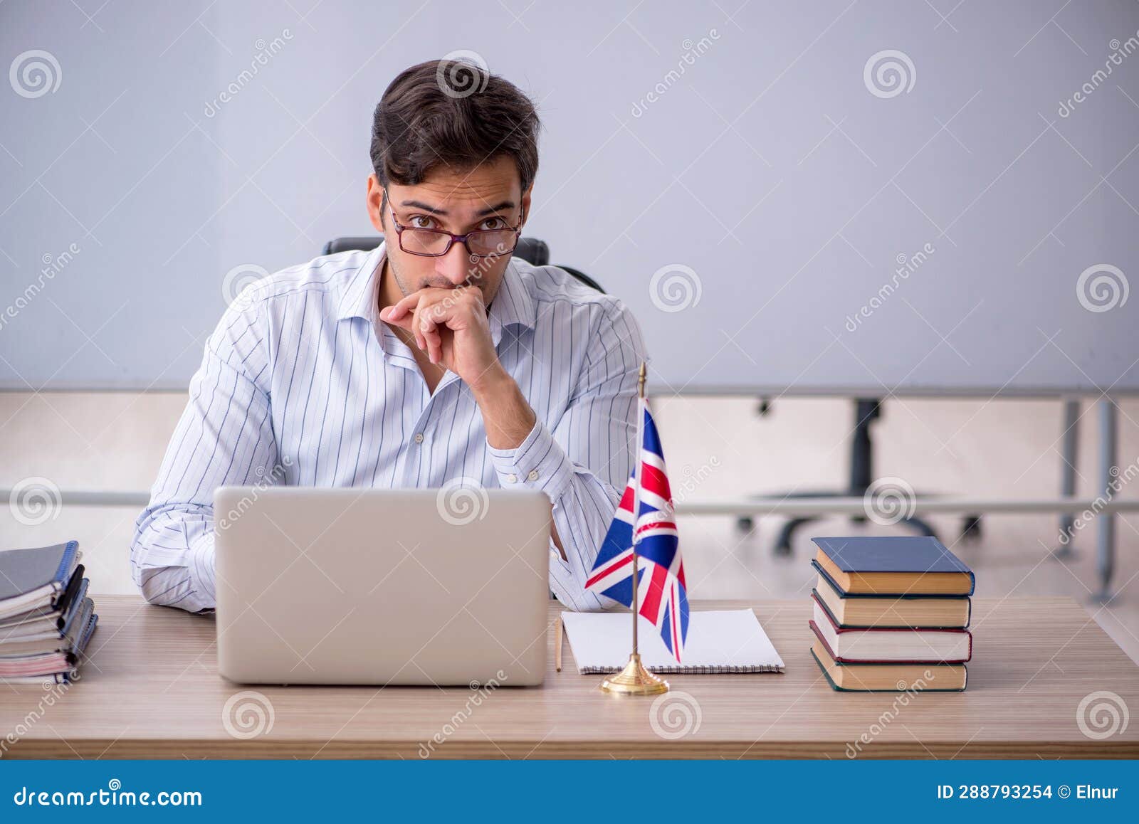 Young Male English Language Teacher in the Classroom Stock Photo ...