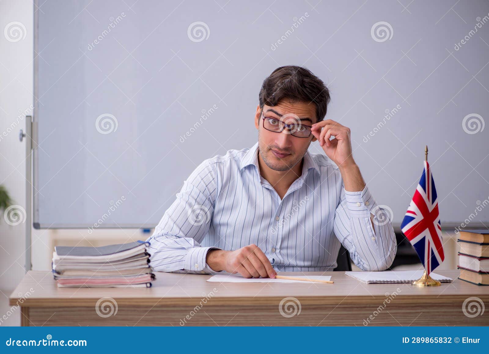Young Male English Language Teacher in the Classroom Stock Photo ...