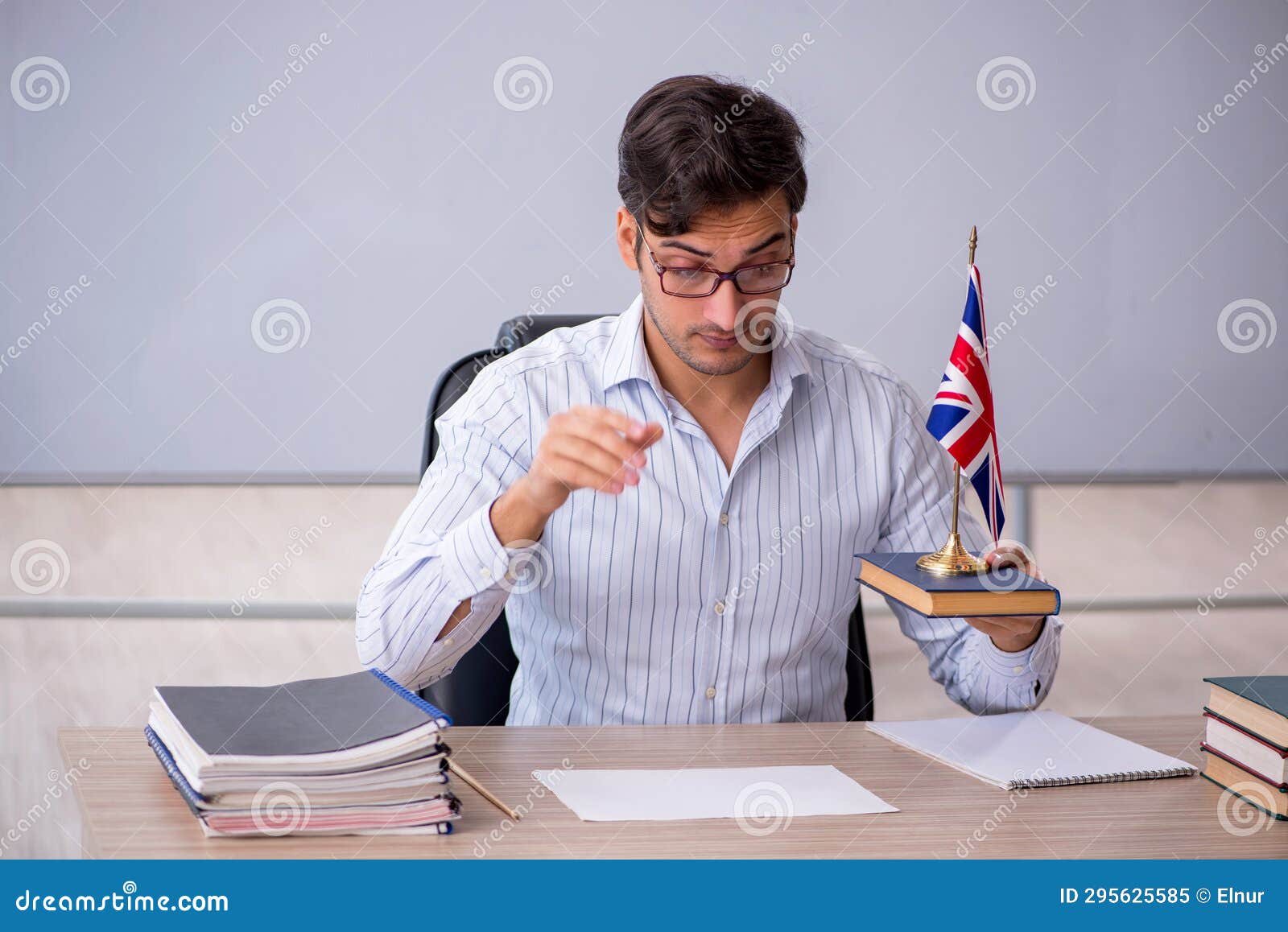 Young Male English Language Teacher in the Classroom Stock Image ...