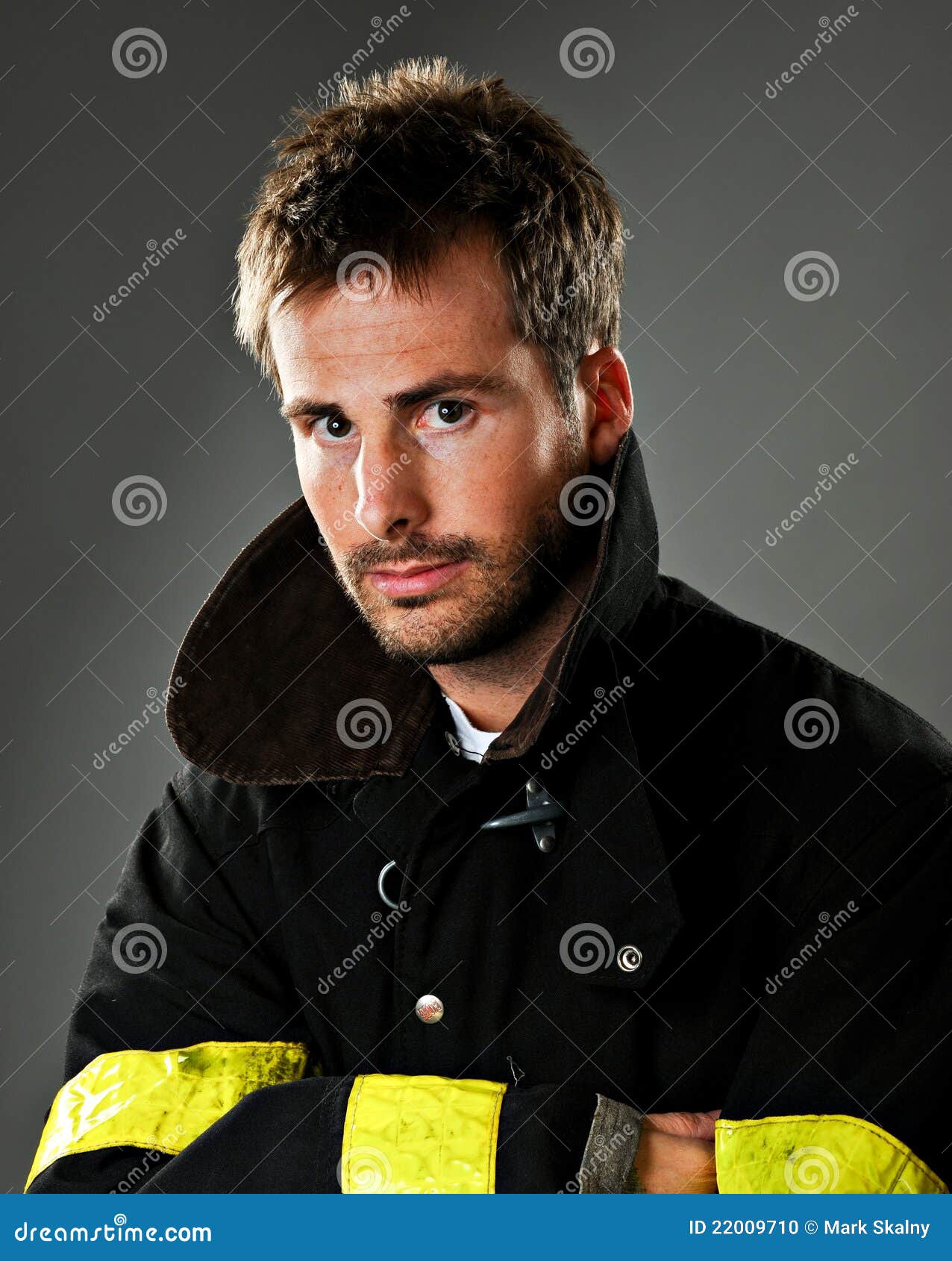 Young male firefighter stock photo. Image of work, uniform - 22009710