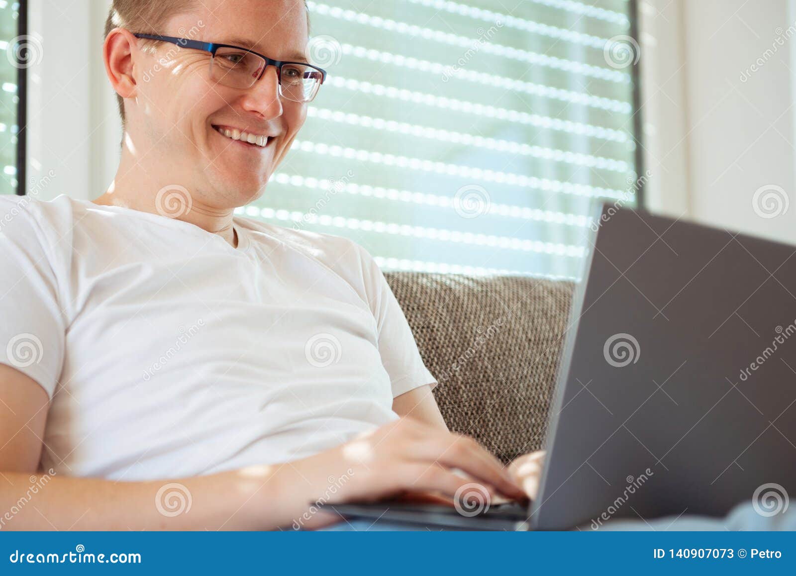 Young Male Freelancer Working with Laptop at Home Stock Image - Image ...