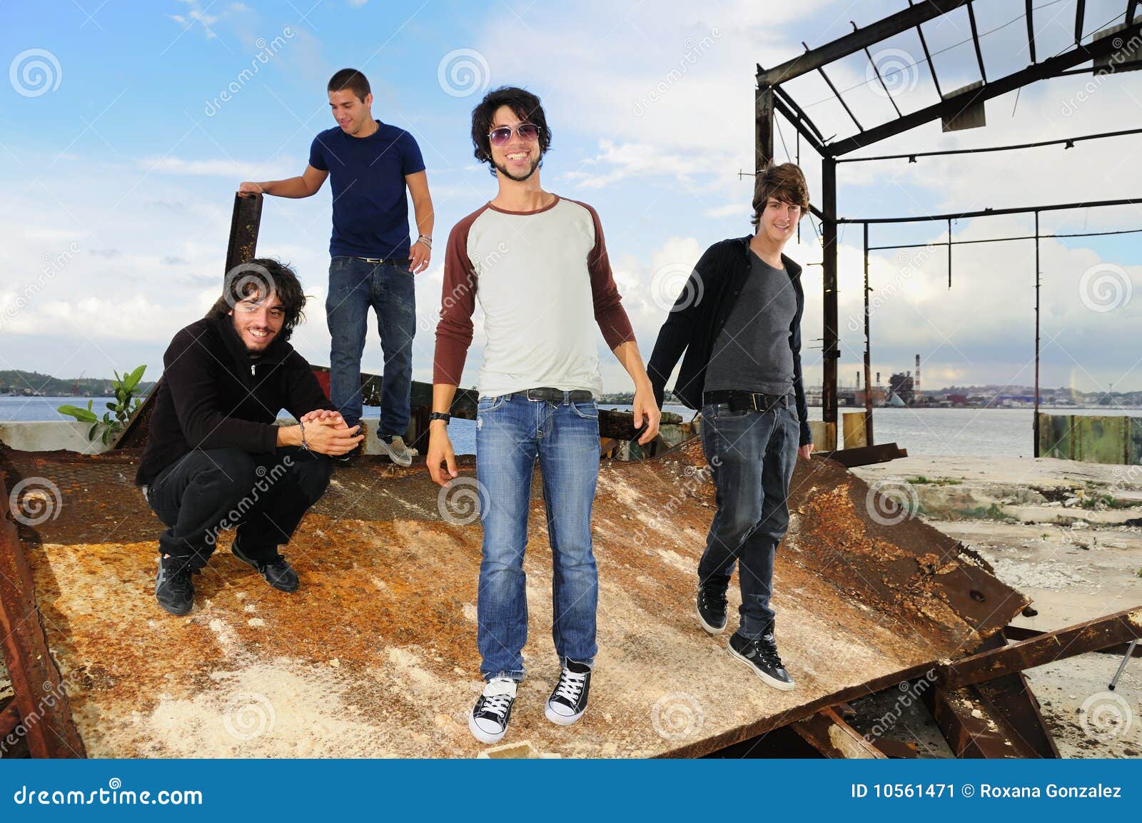 Young male friends posing stock image. Image of diverse - 10561471