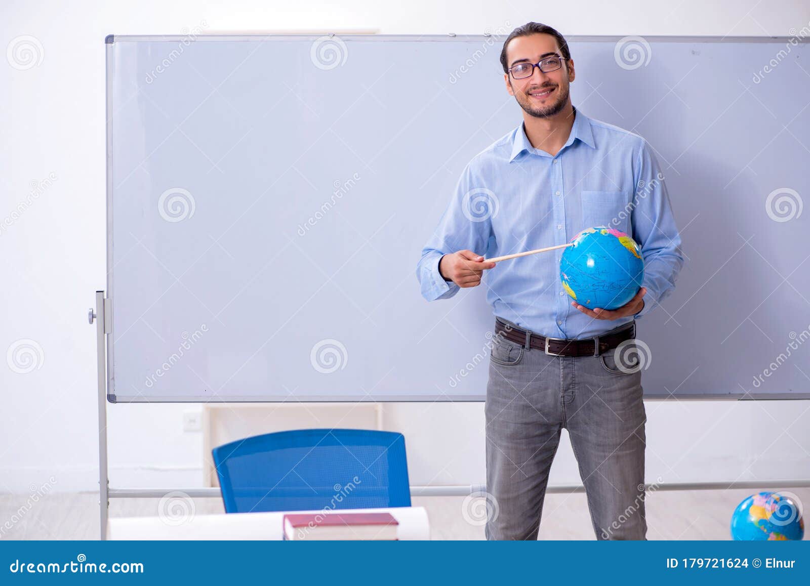Young Male Geography Teacher in Front of Whiteboard Stock Photo - Image ...