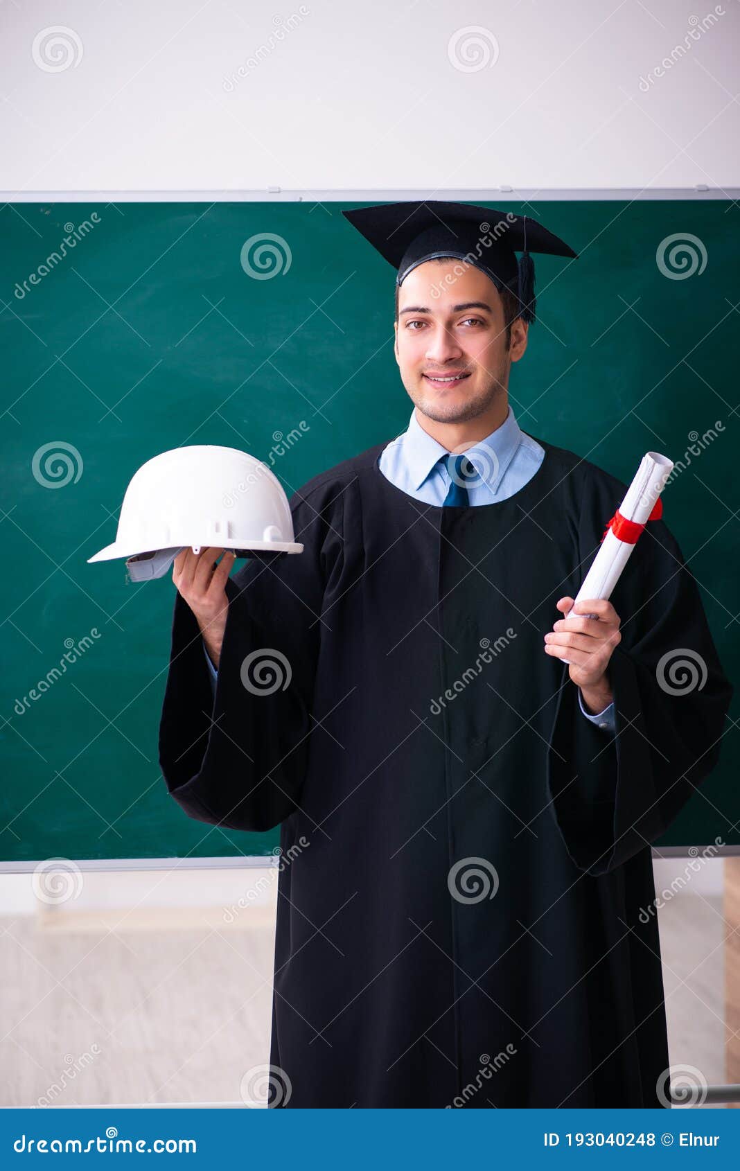 Young Male Graduate in Front of Board Stock Photo - Image of blackboard ...