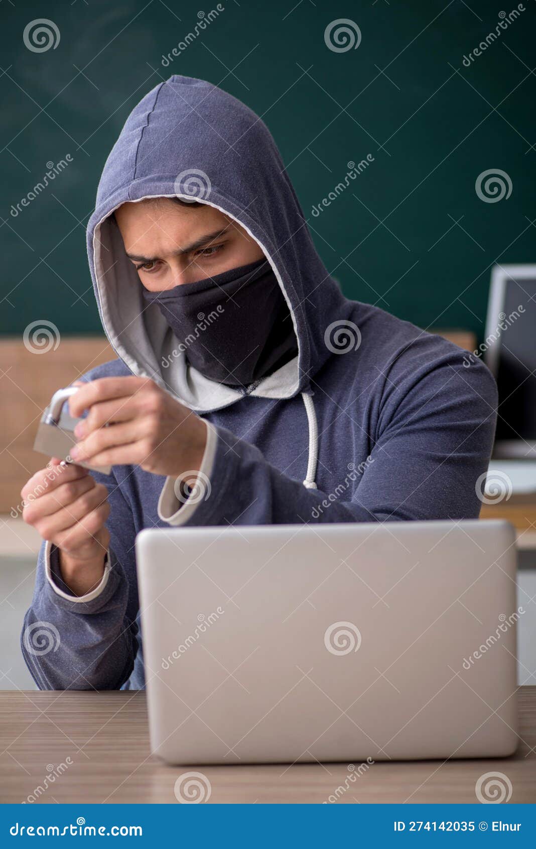 Young Male Hacker Sitting in the Classroom Stock Image - Image of ...