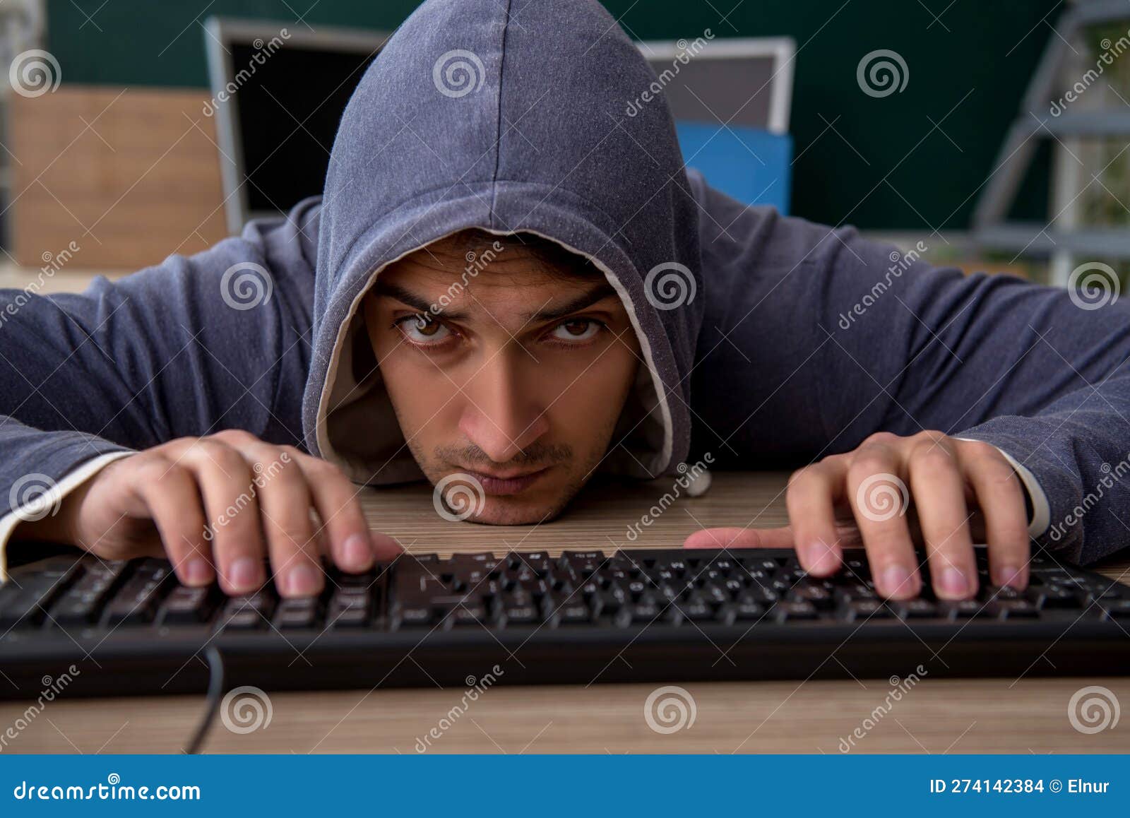 Young Male Hacker Sitting in the Classroom Stock Photo - Image of class ...