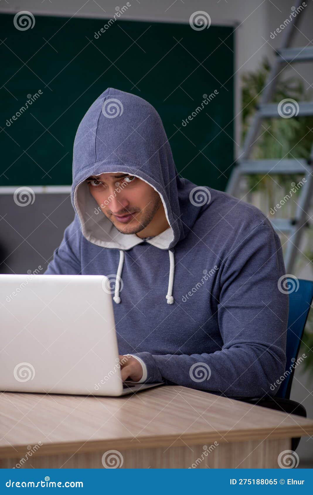 Young Male Hacker Sitting in the Classroom Stock Image - Image of ...