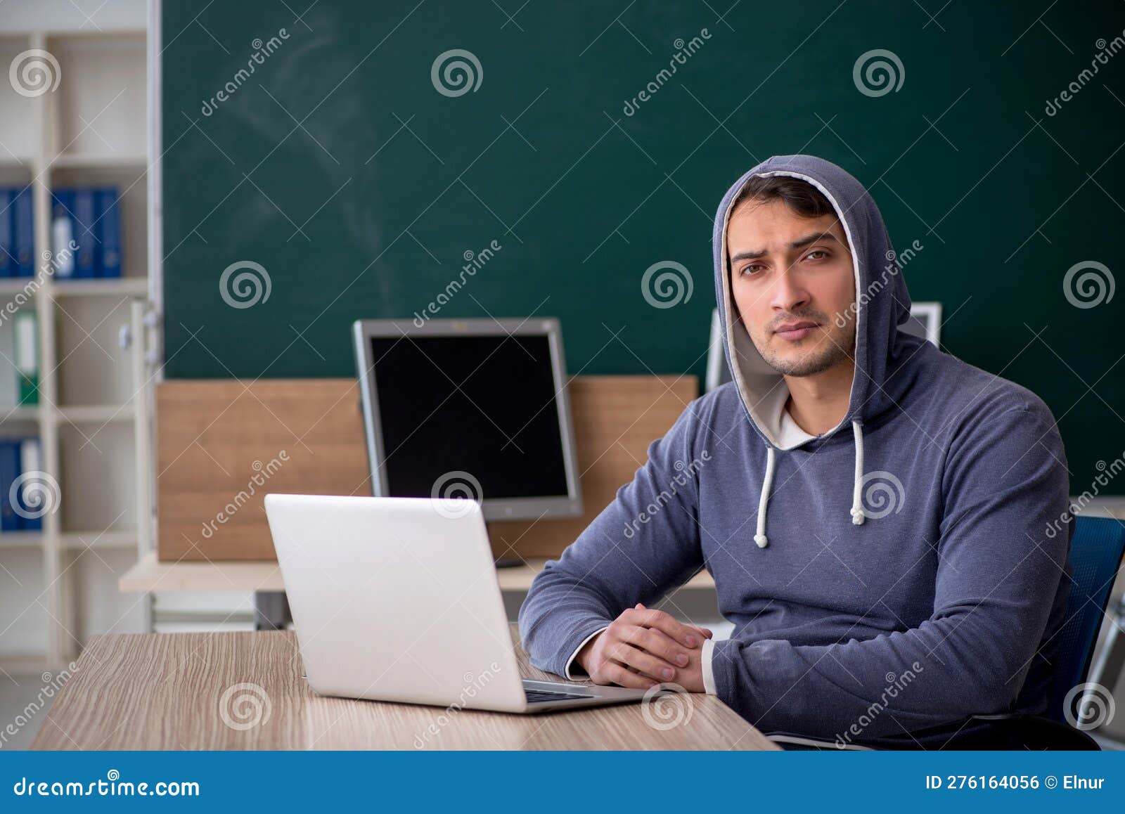 Young Male Hacker Sitting in the Classroom Stock Photo - Image of ...