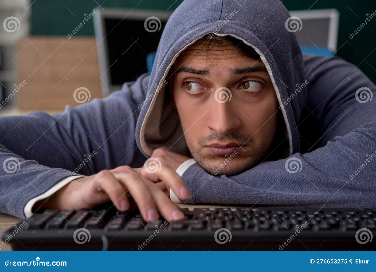 Young Male Hacker Sitting in the Classroom Stock Image - Image of ...
