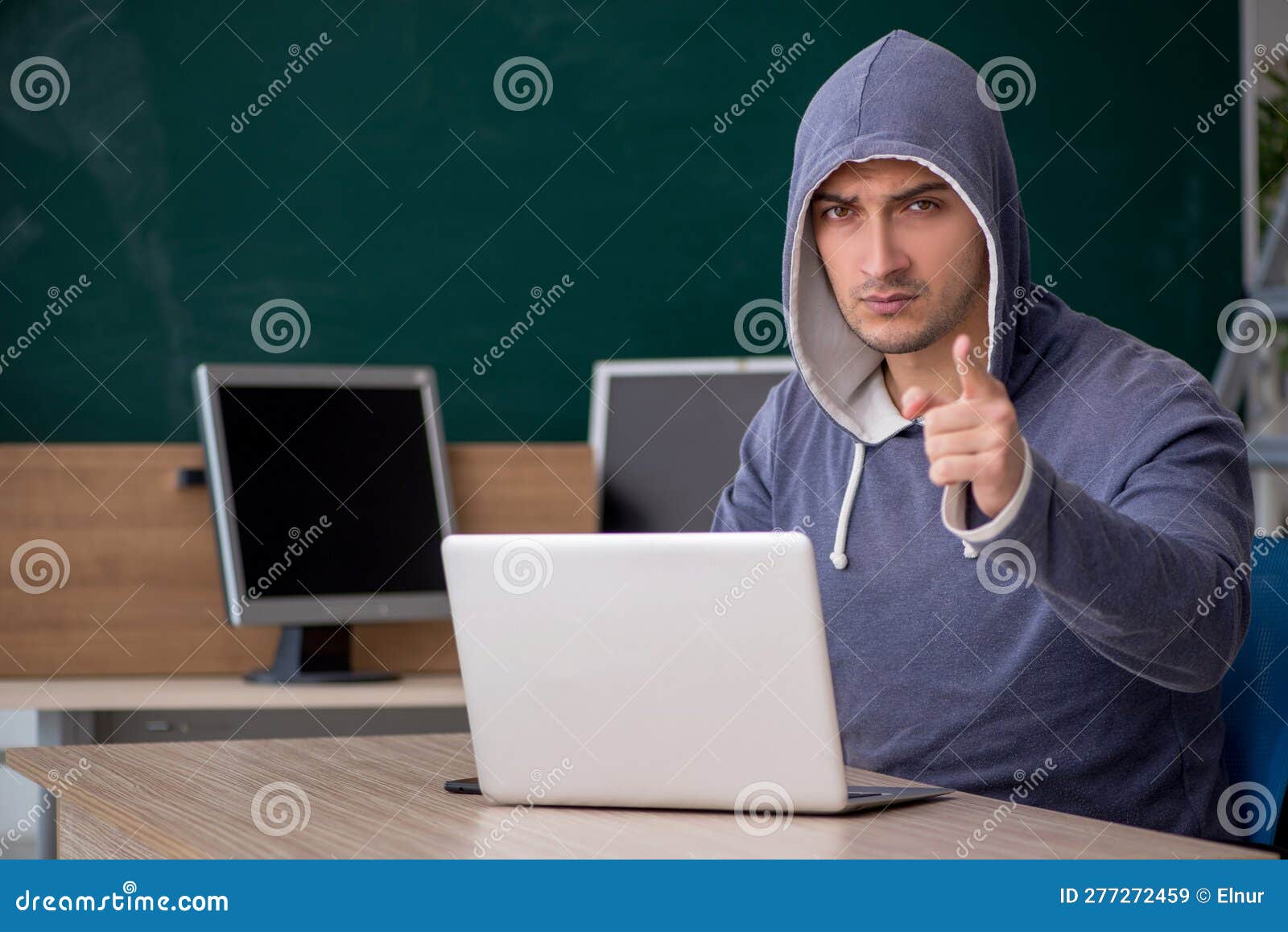 Young Male Hacker Sitting in the Classroom Stock Image - Image of ...