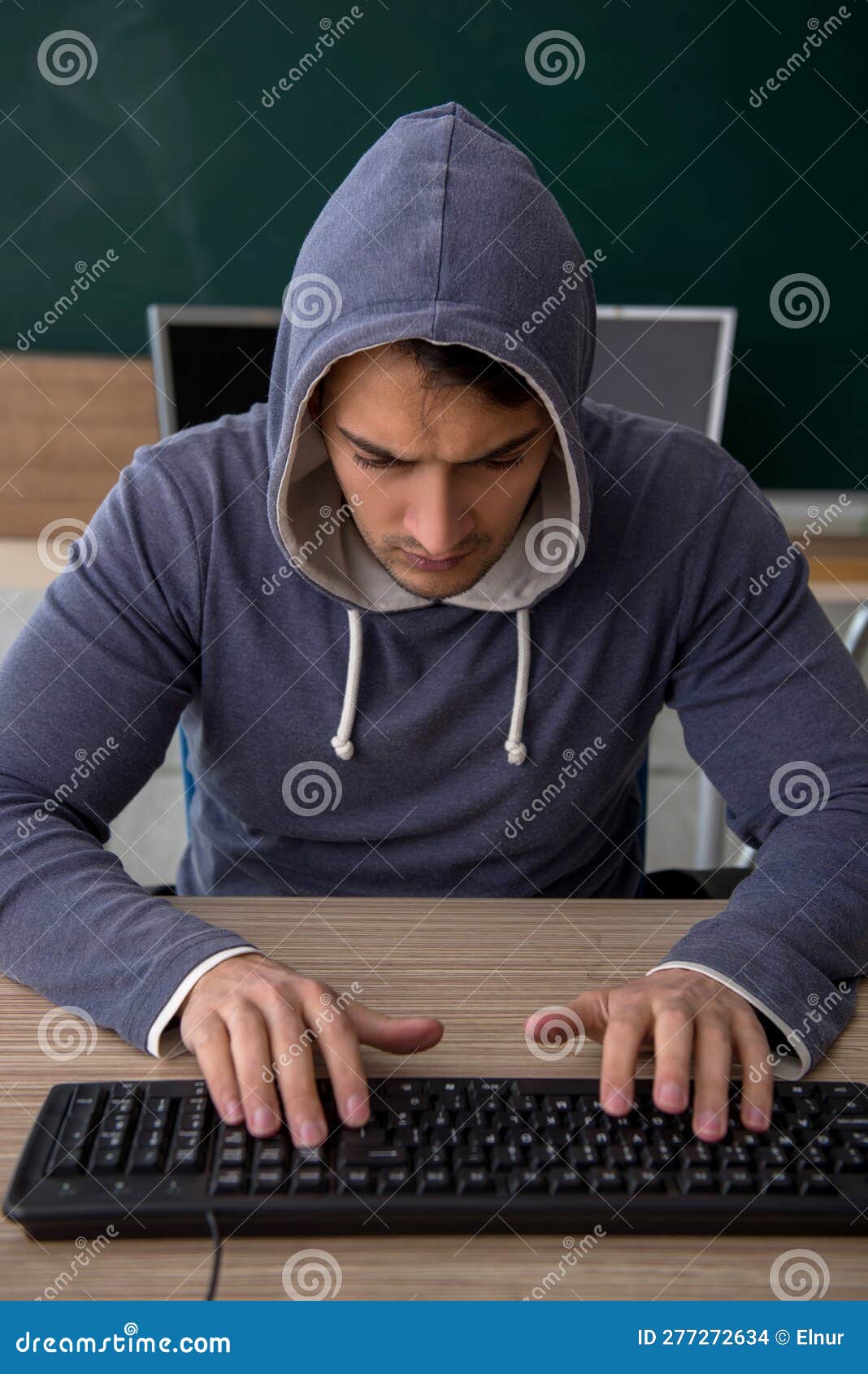 Young Male Hacker Sitting in the Classroom Stock Photo - Image of class ...