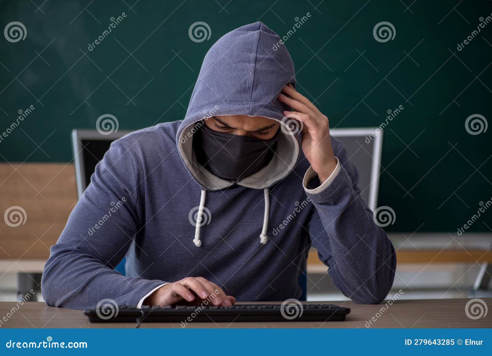 Young Male Hacker Sitting in the Classroom Stock Image - Image of ...