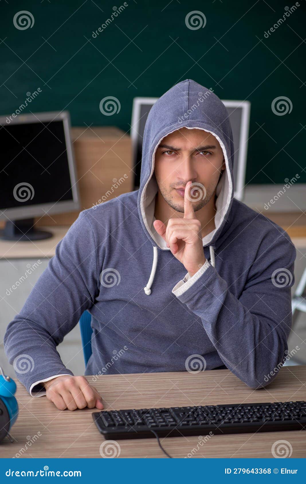 Young Male Hacker Sitting in the Classroom Stock Photo - Image of ...