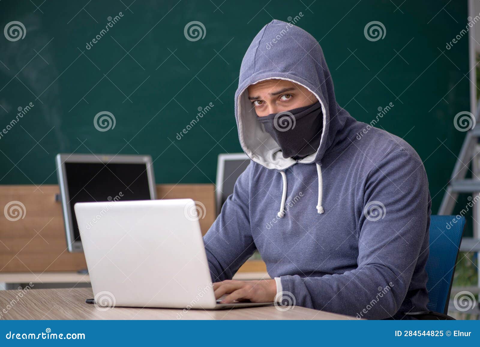 Young Male Hacker Sitting in the Classroom Stock Image - Image of ...