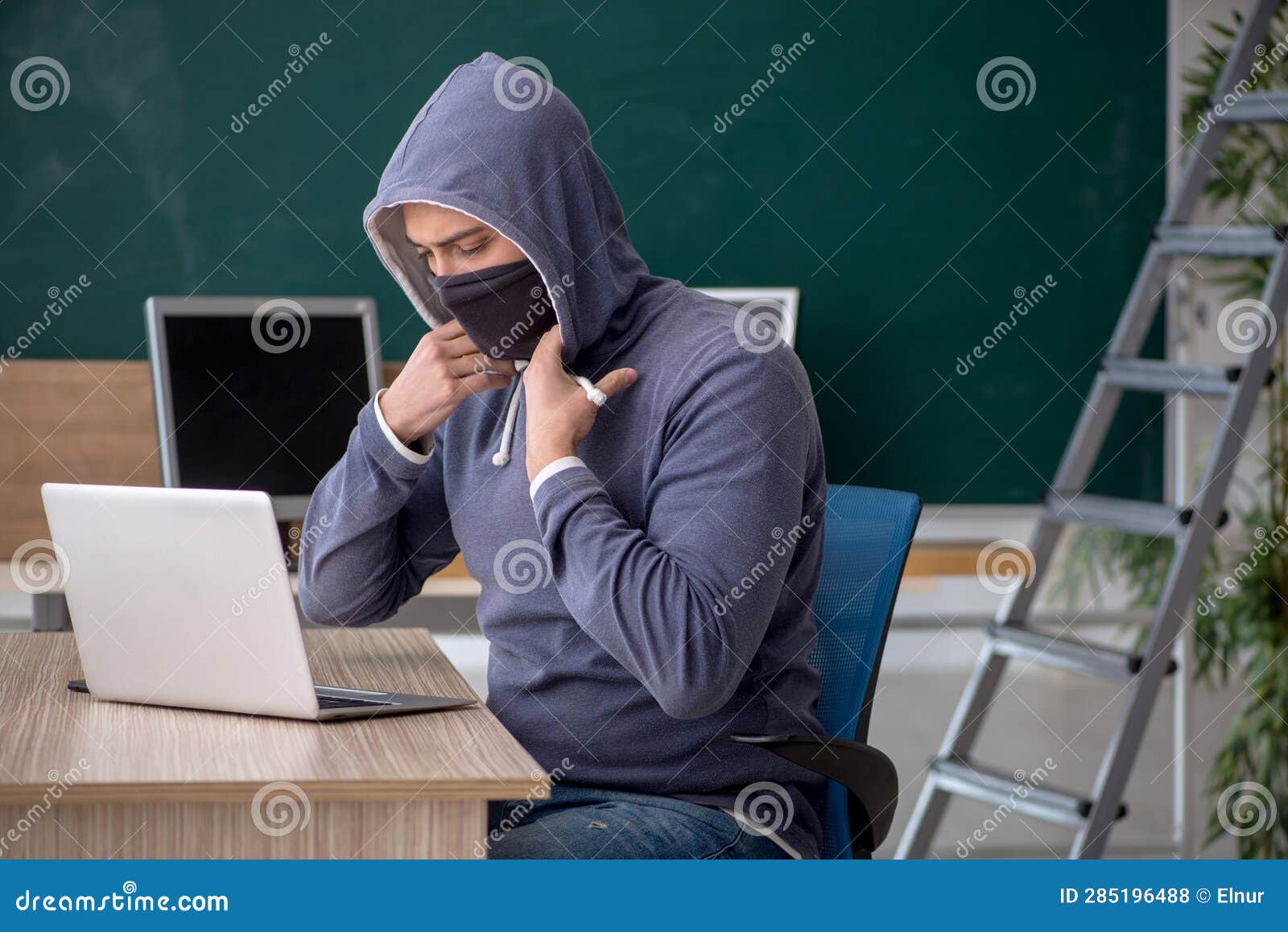 Young Male Hacker Sitting in the Classroom Stock Photo - Image of ...