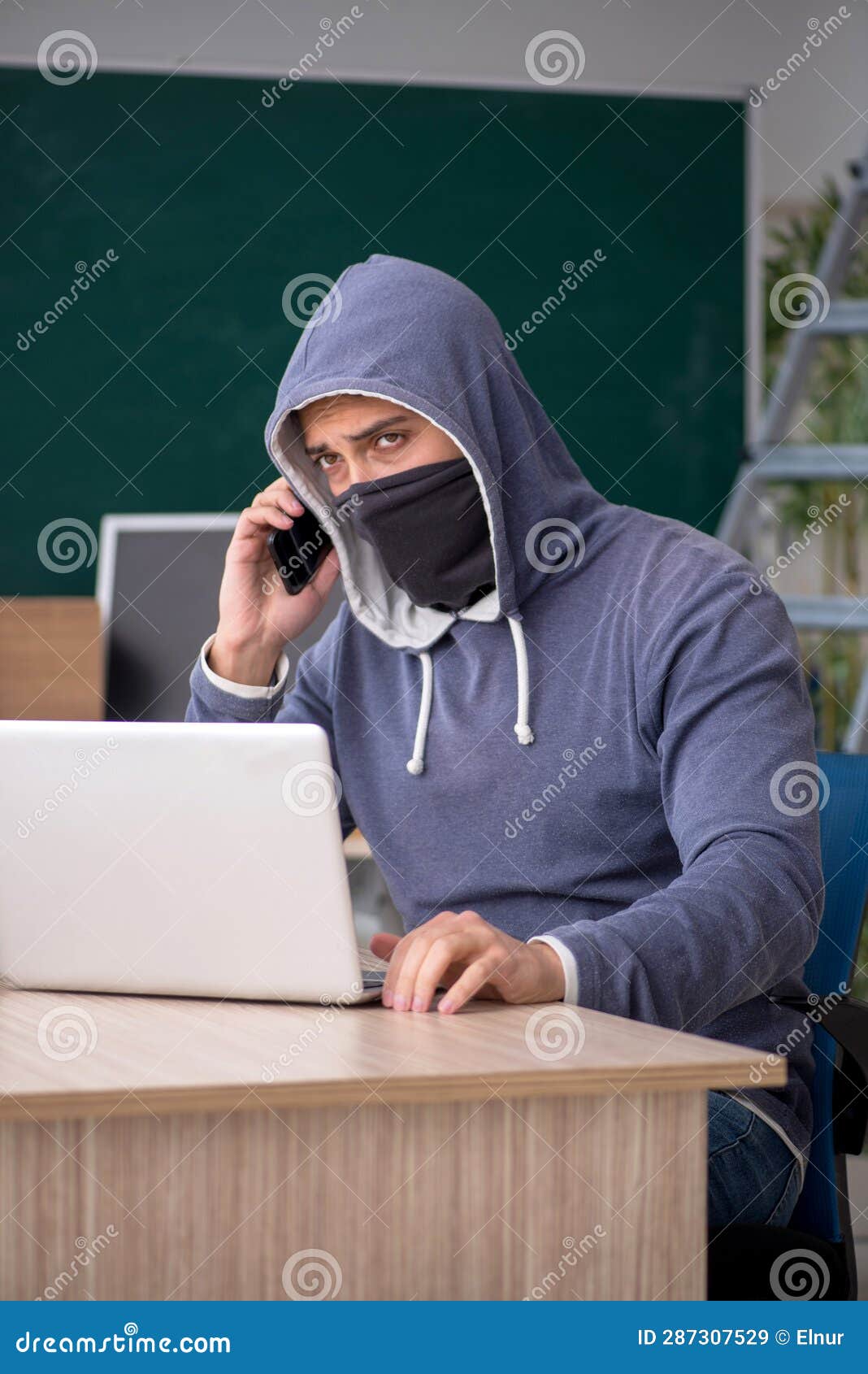 Young Male Hacker Sitting in the Classroom Stock Image - Image of ...